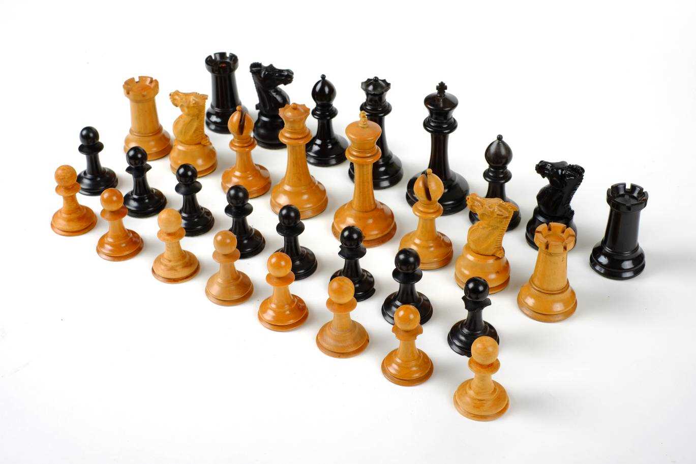 Lot 122 - Ten wooden chess sets,