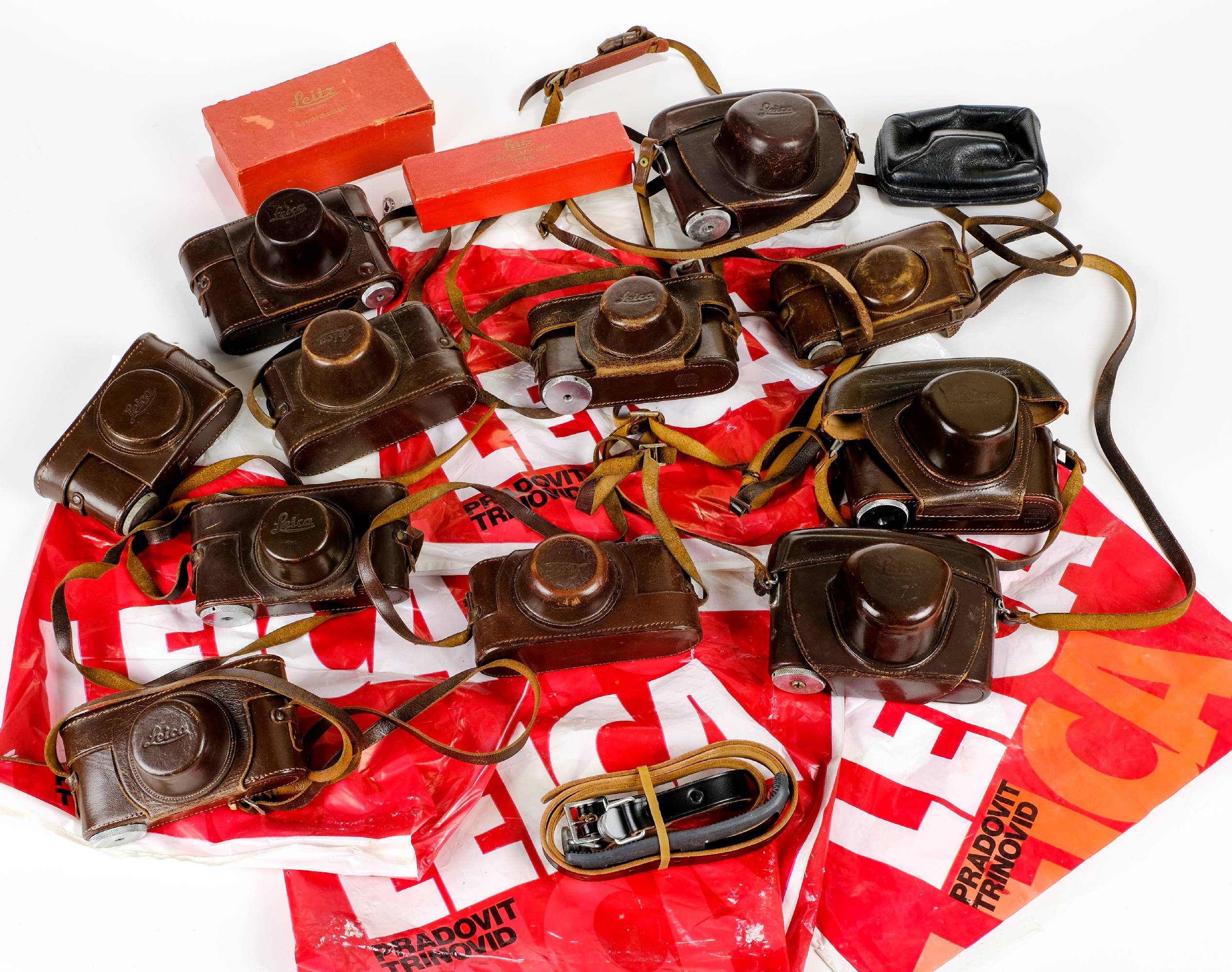 Lot 365 - Leica camera cases.