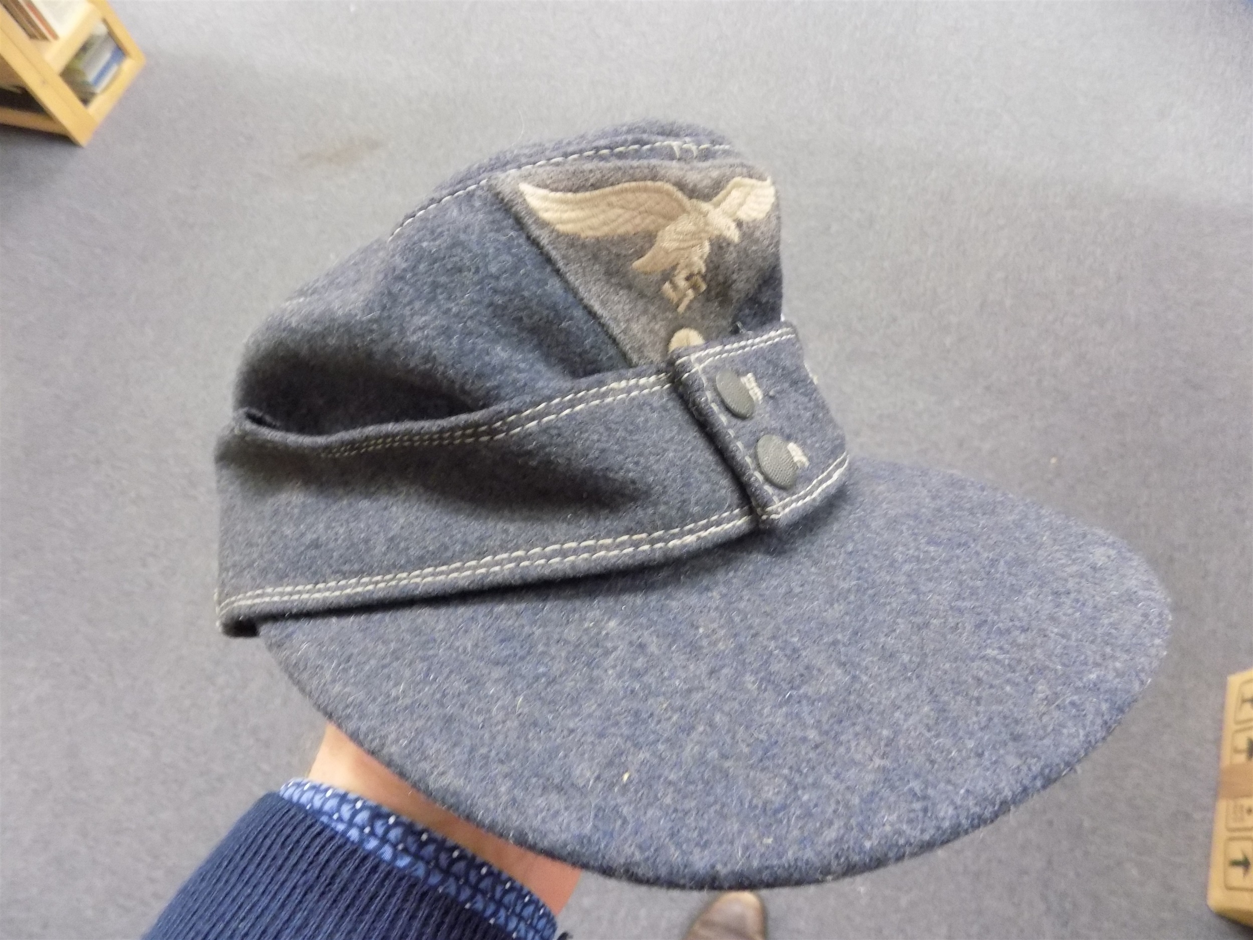 Lot 206 - WWII German hats. A Luftwaffe M43 cap and