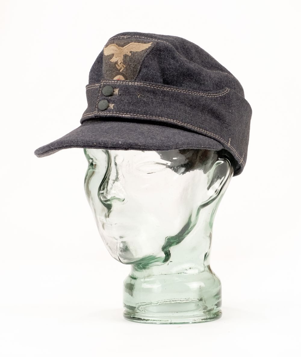 Lot 206 - WWII German hats. A Luftwaffe M43 cap and