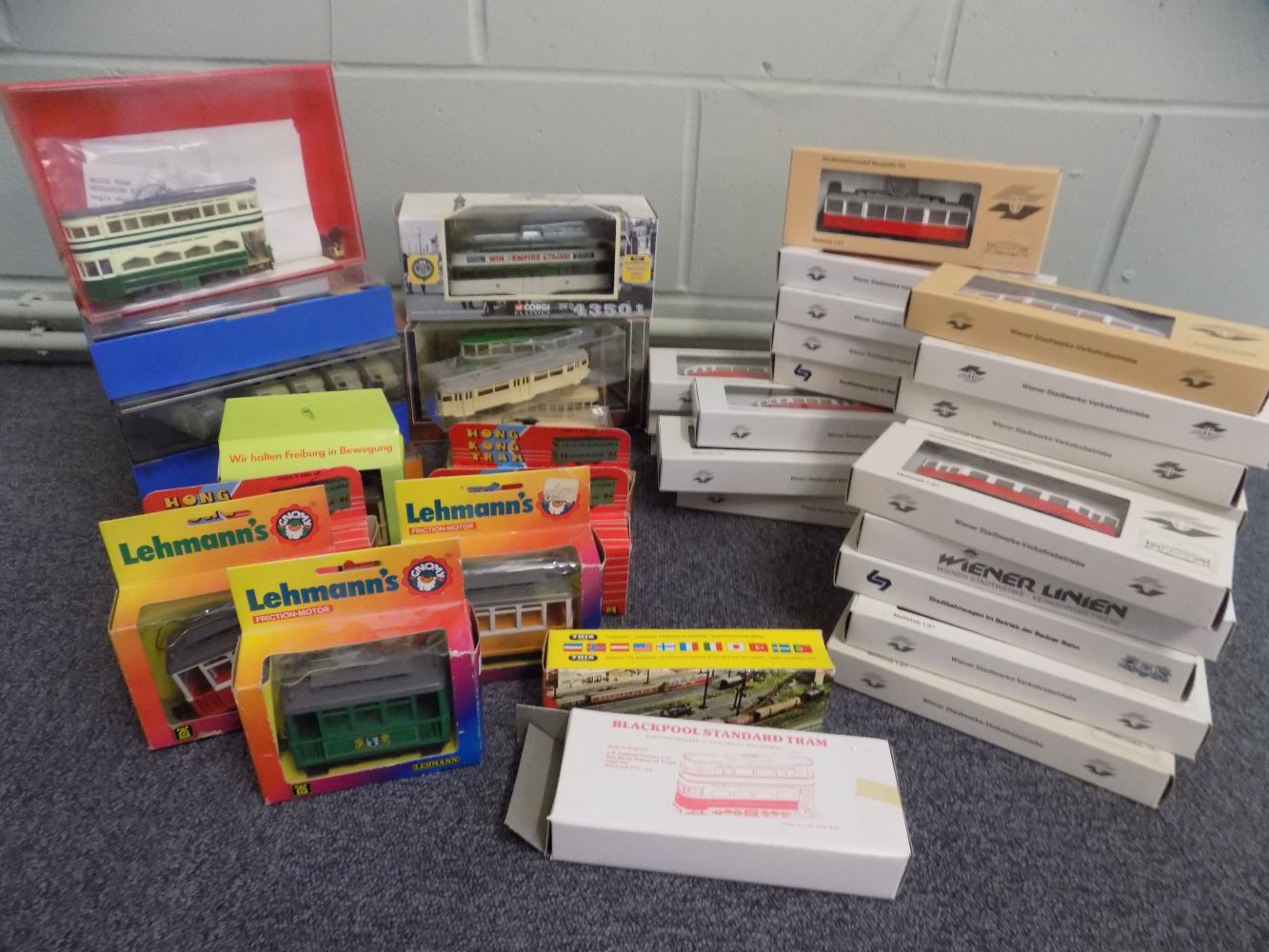 Lot 8 - Trams. A collection of die cast model trams