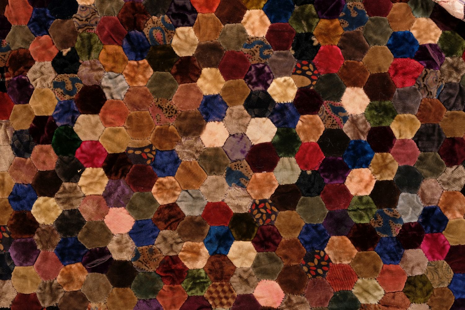 Lot 182 - Quilts. A Victorian velvet patchwork quilt,