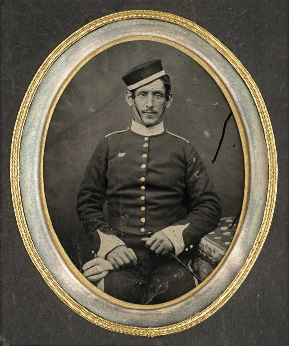 Lot 155 - Half-plate ambrotype of a soldier of the