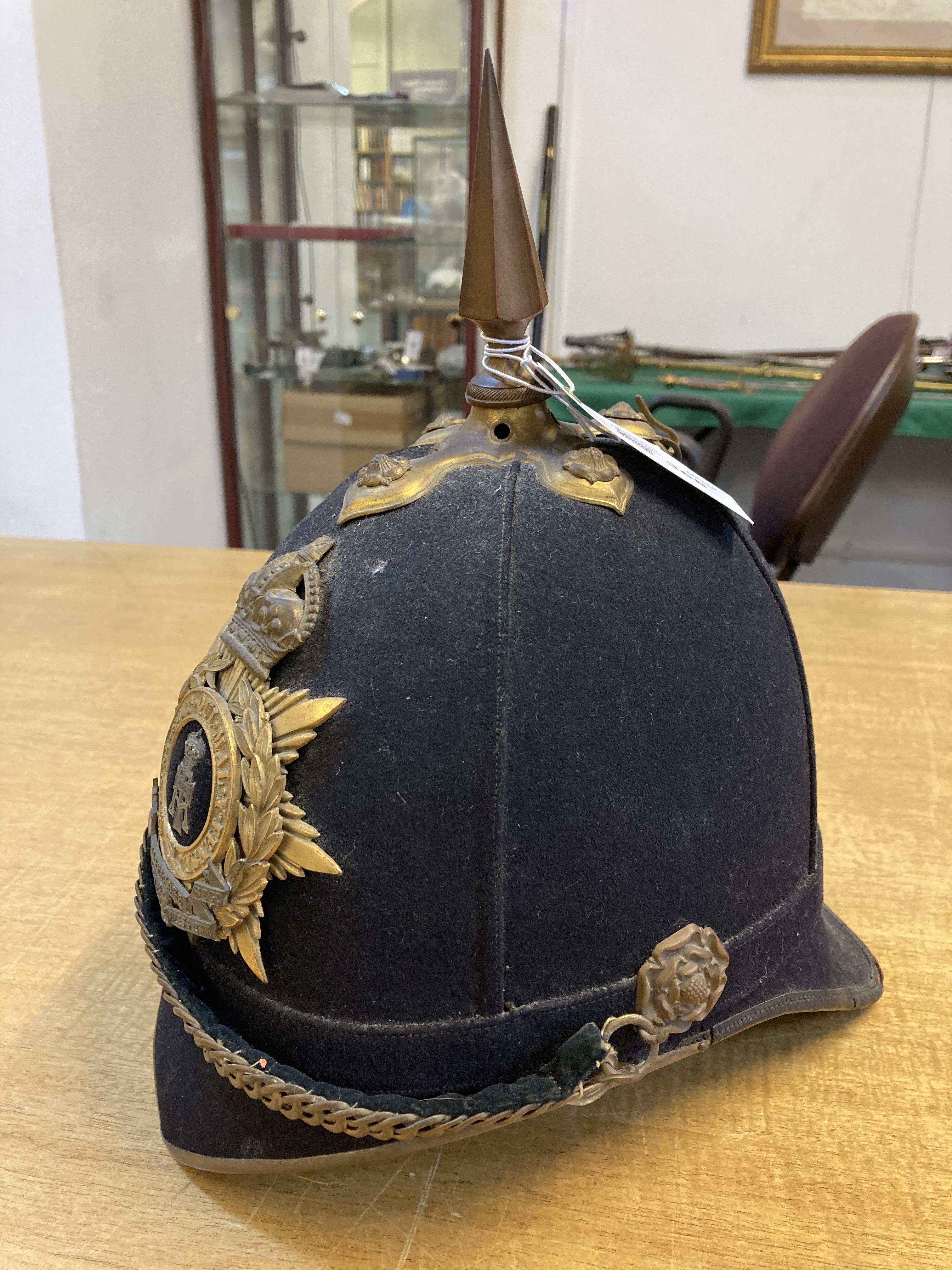 Lot 368 - Helmet. Green Howards blue cloth helmet.