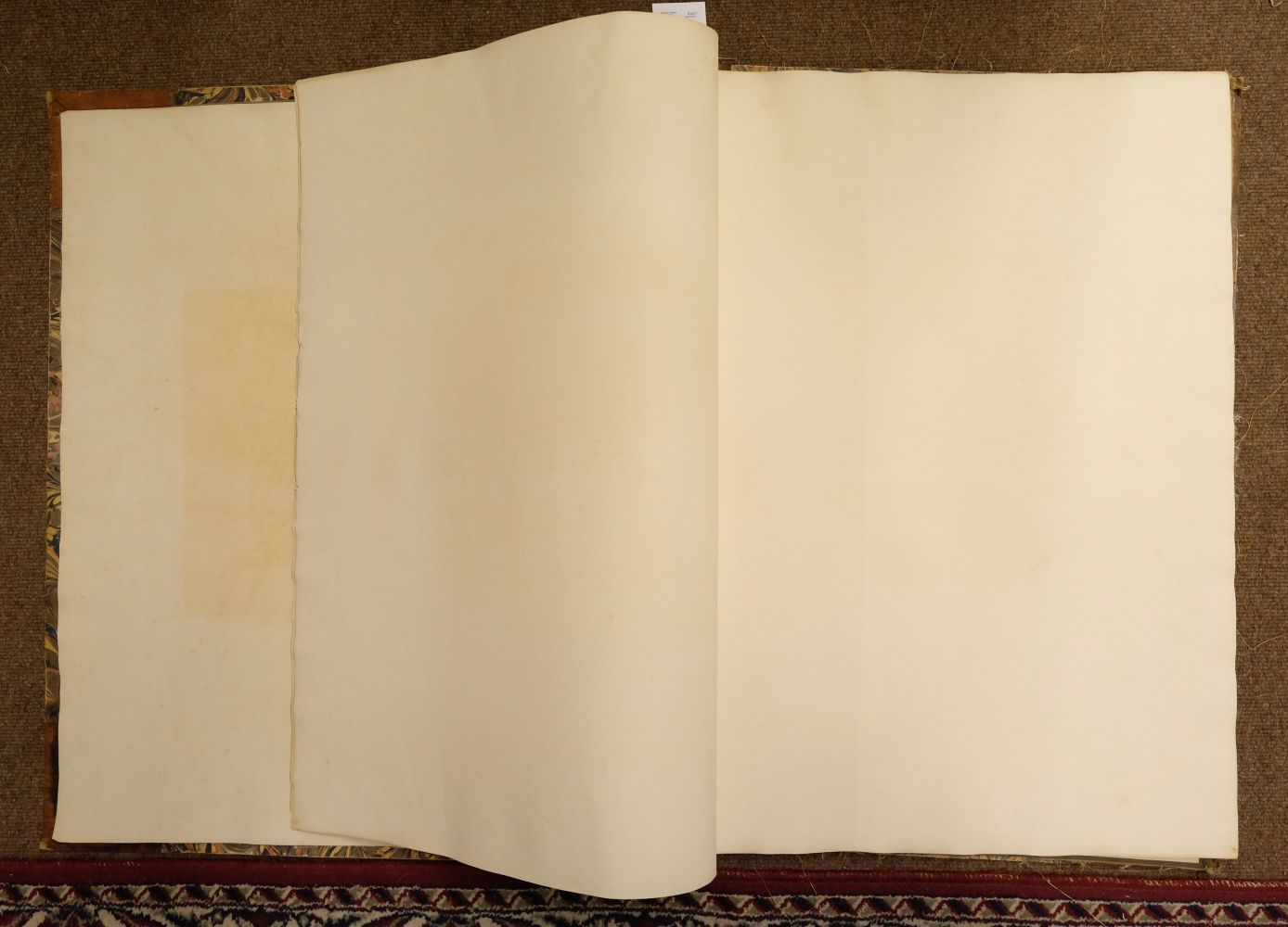 Lot 550 - Paper - Handmade. A folio volume of blank