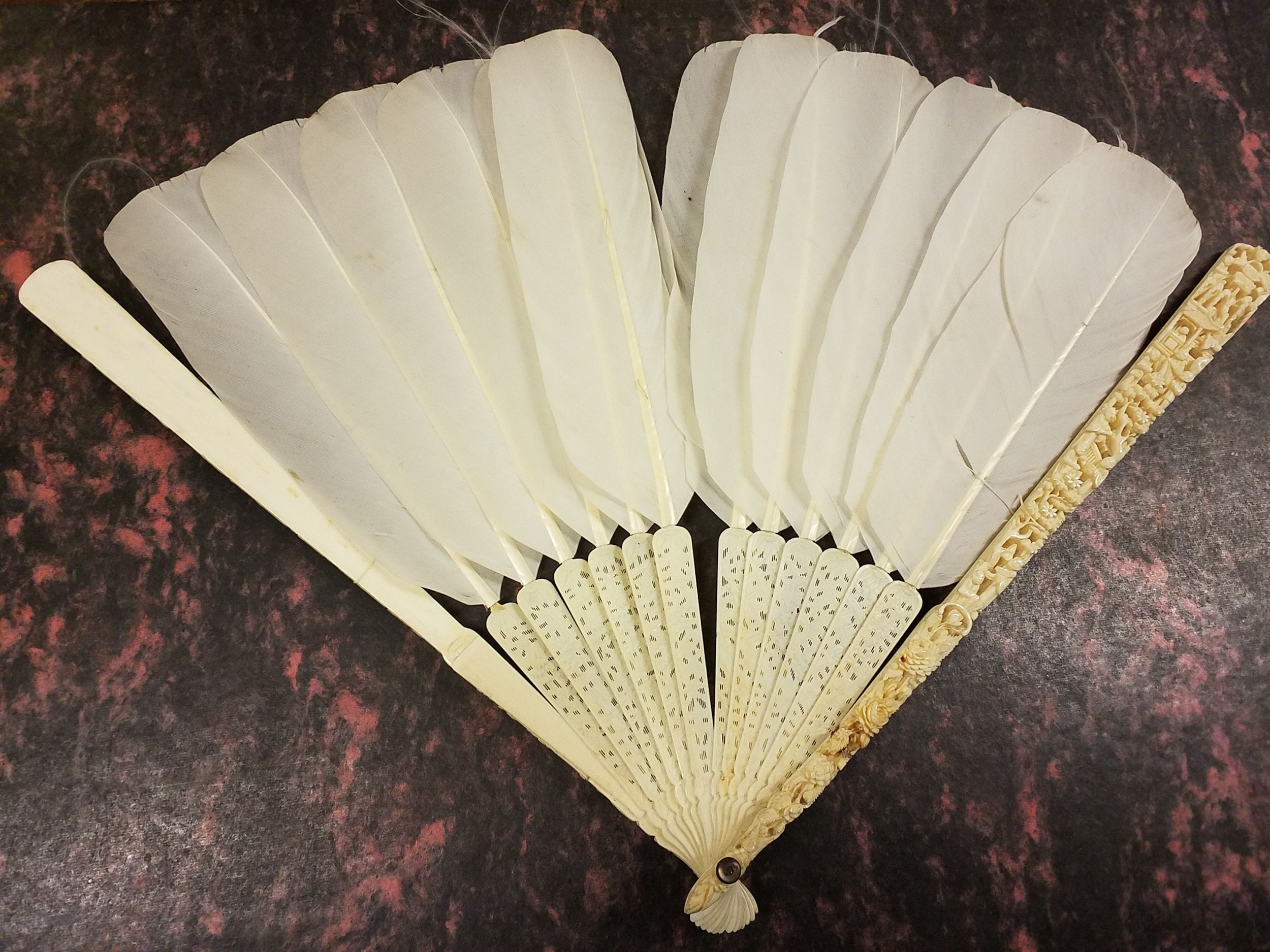 Lot 354 - Chinese. An ivory cockade fan, late