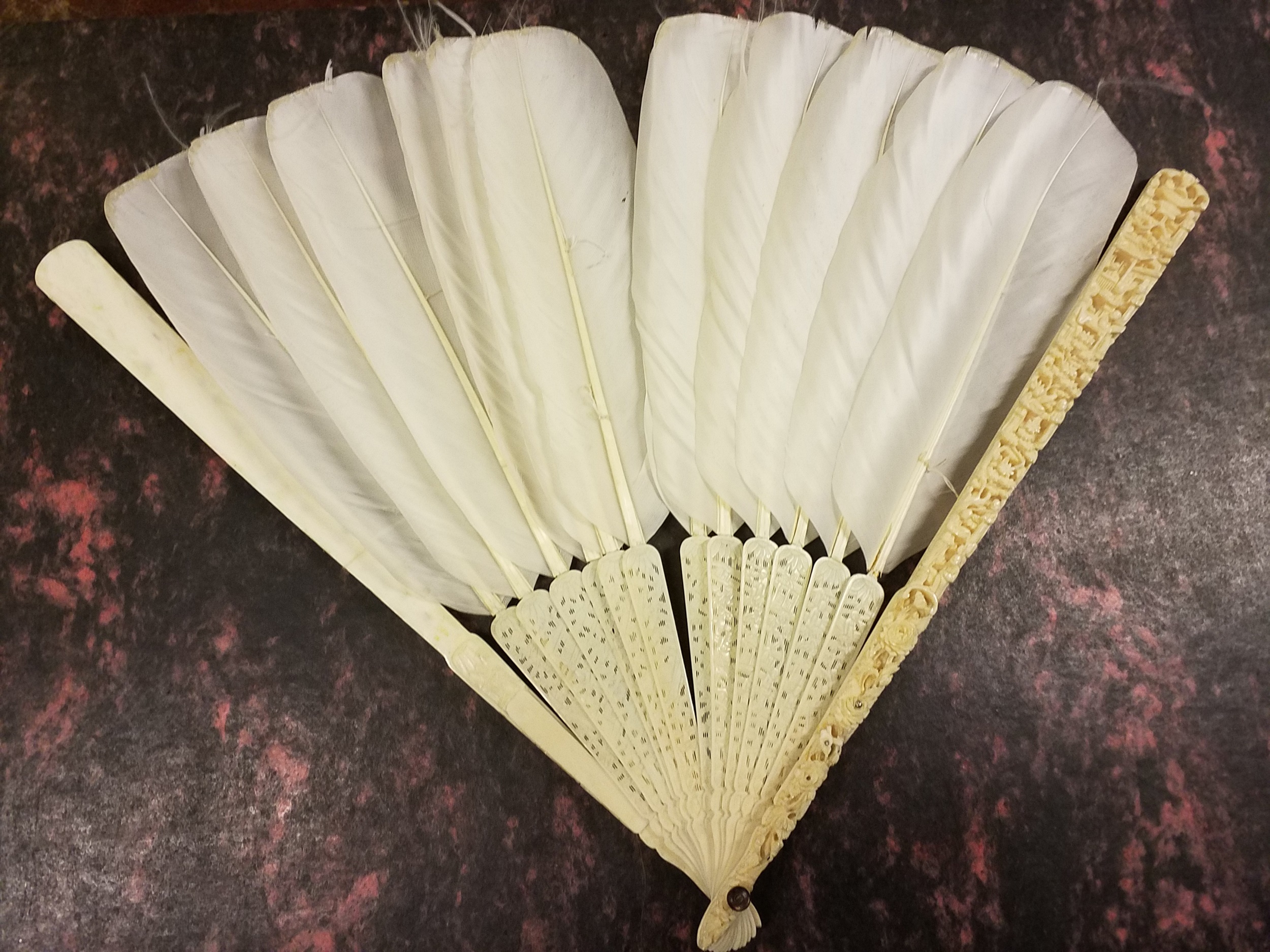 Lot 354 - Chinese. An ivory cockade fan, late