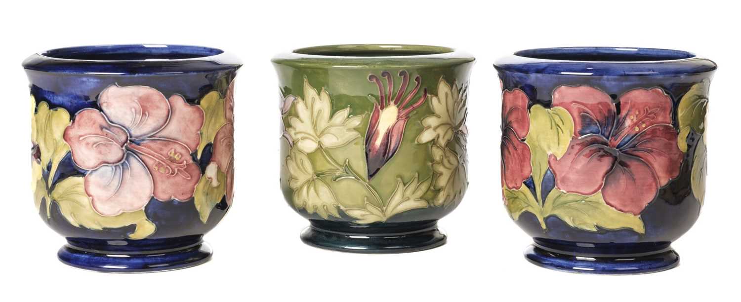 Lot 8 - Moorcroft. A Moorcoft Hibiscus pattern pottery