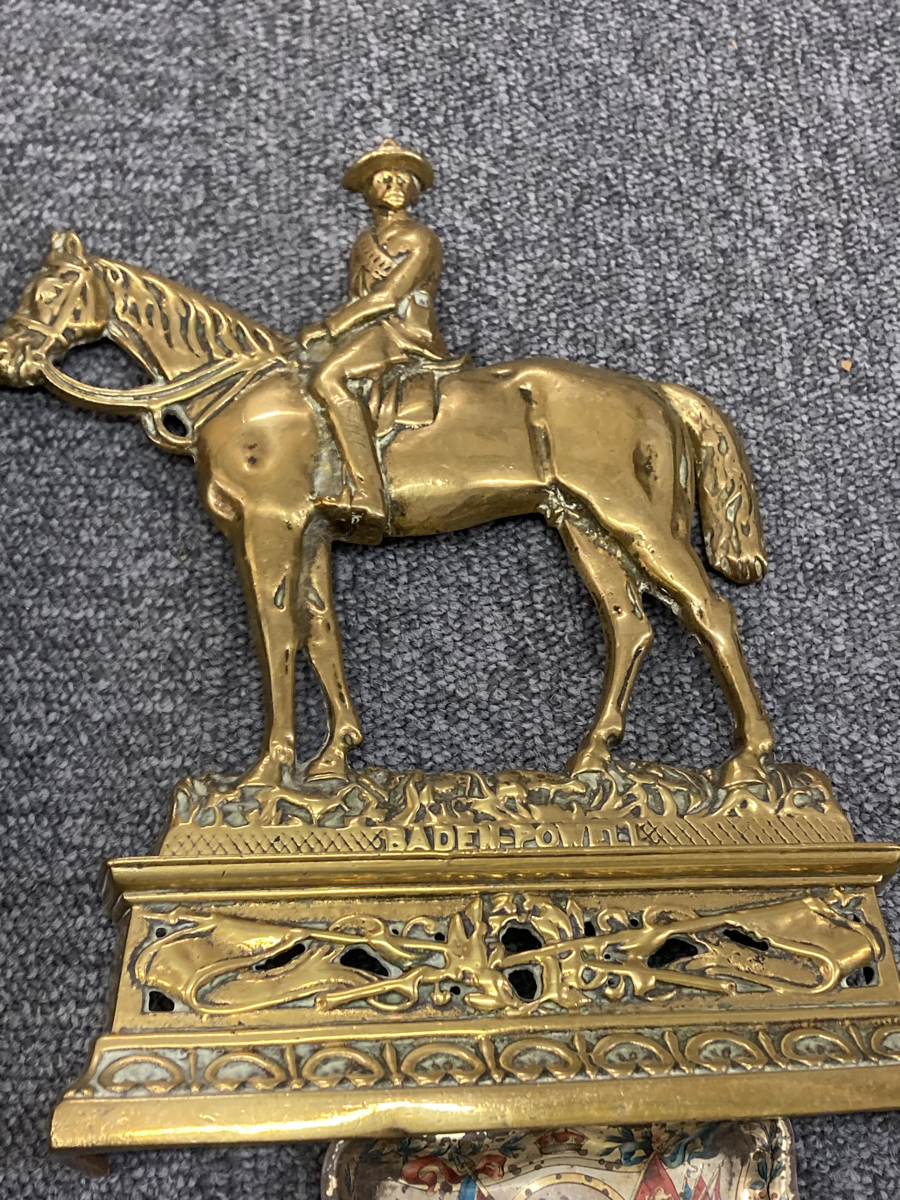 Lot 317 - Scouting. A circular bronze Baden-Powell