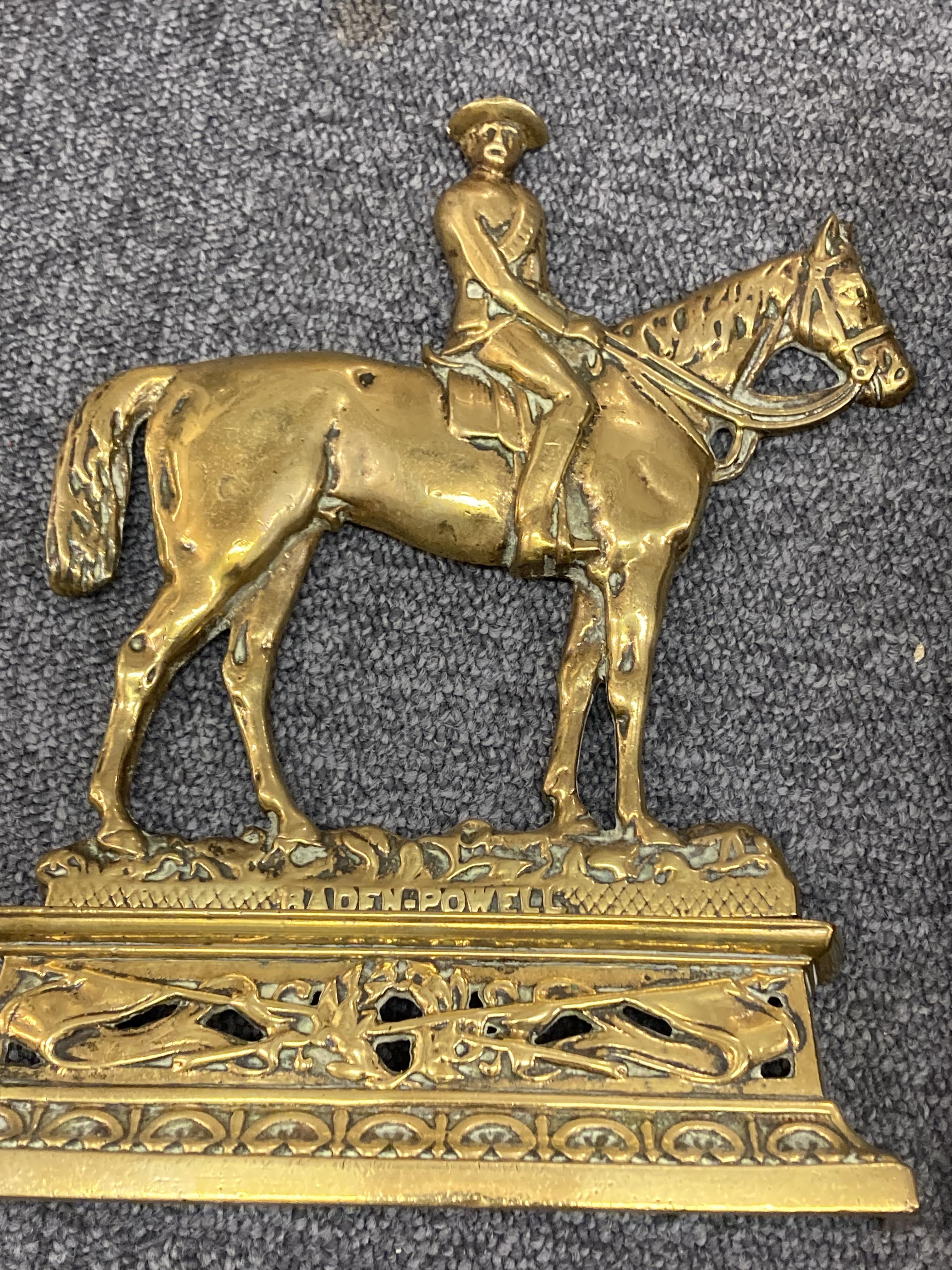 Lot 317 - Scouting. A circular bronze Baden-Powell