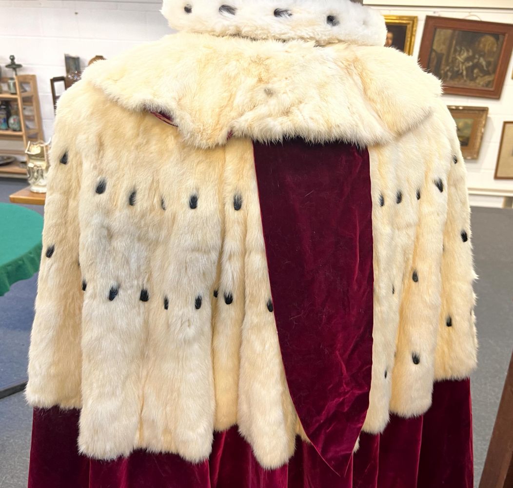 Lot 599 - Coronation robes. A set of robes and