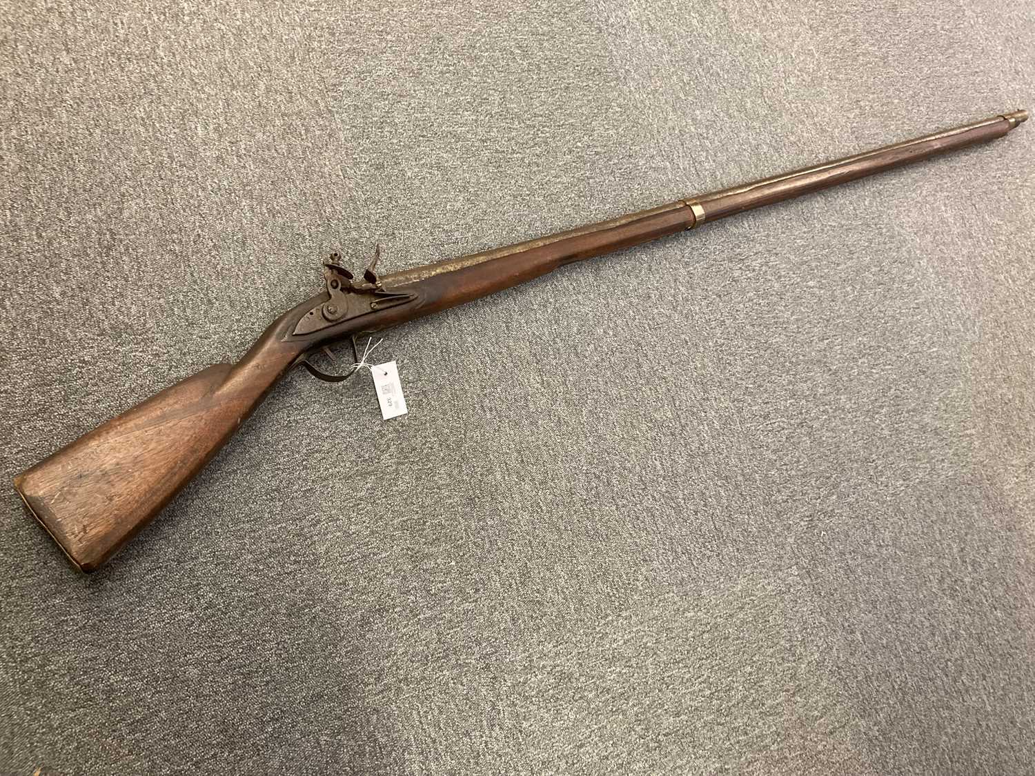 Lot 329 - Gun. A 19th-century flintlock musket,