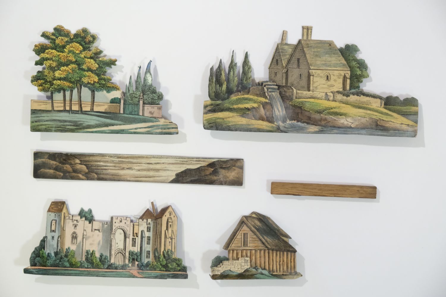 Lot 502 - Miniature scenery. A collection of cut-out
