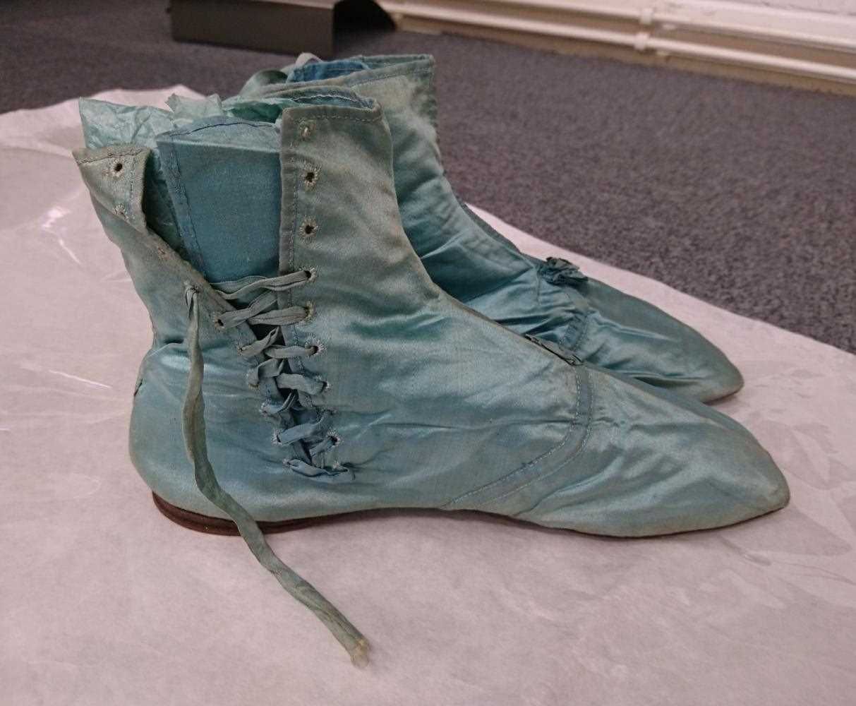 Lot 598 - Clothing. A pair of Regency silk half boots,