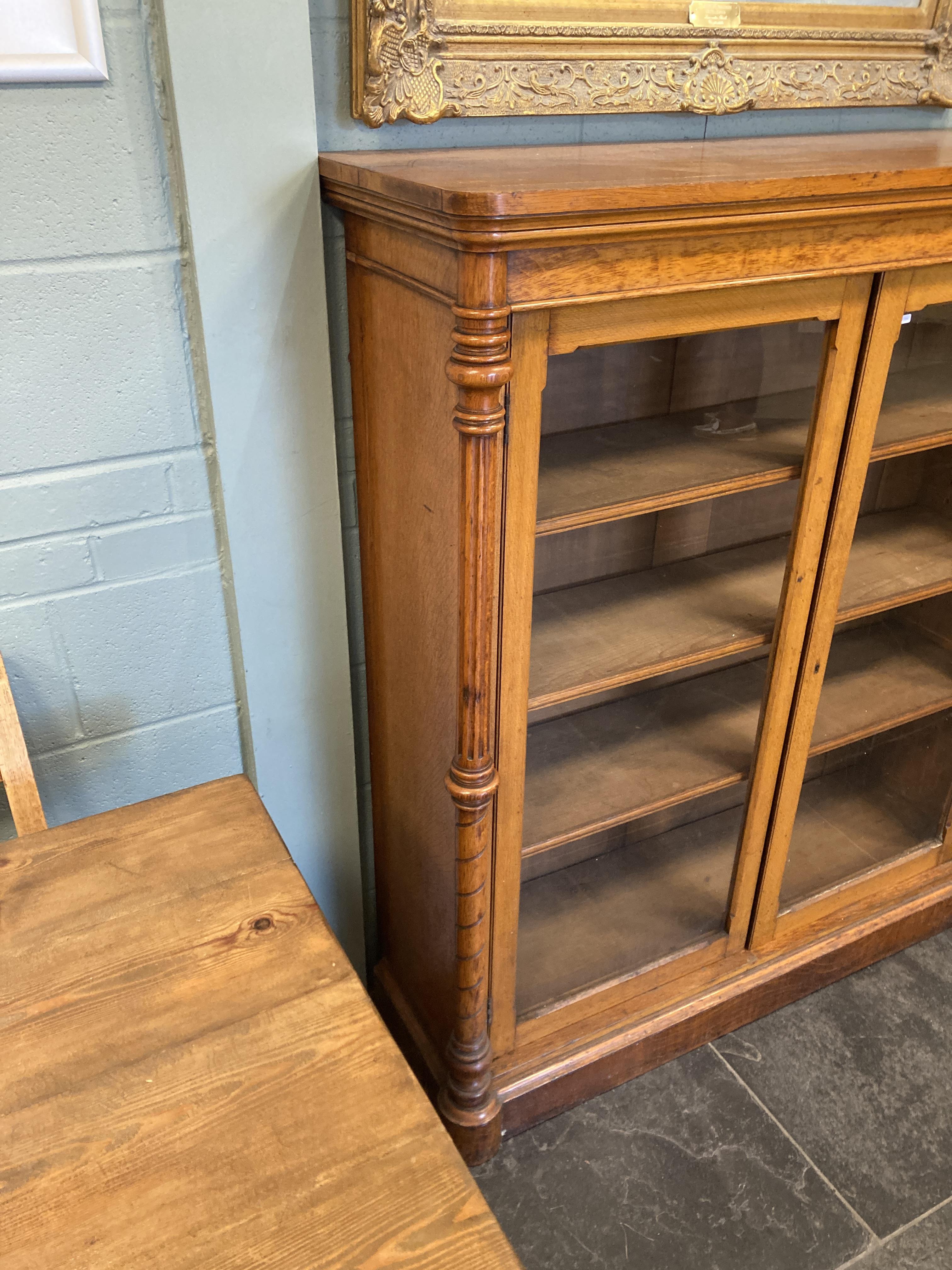 Lot 588 - Display Cabinets. A pair of Victorian oak