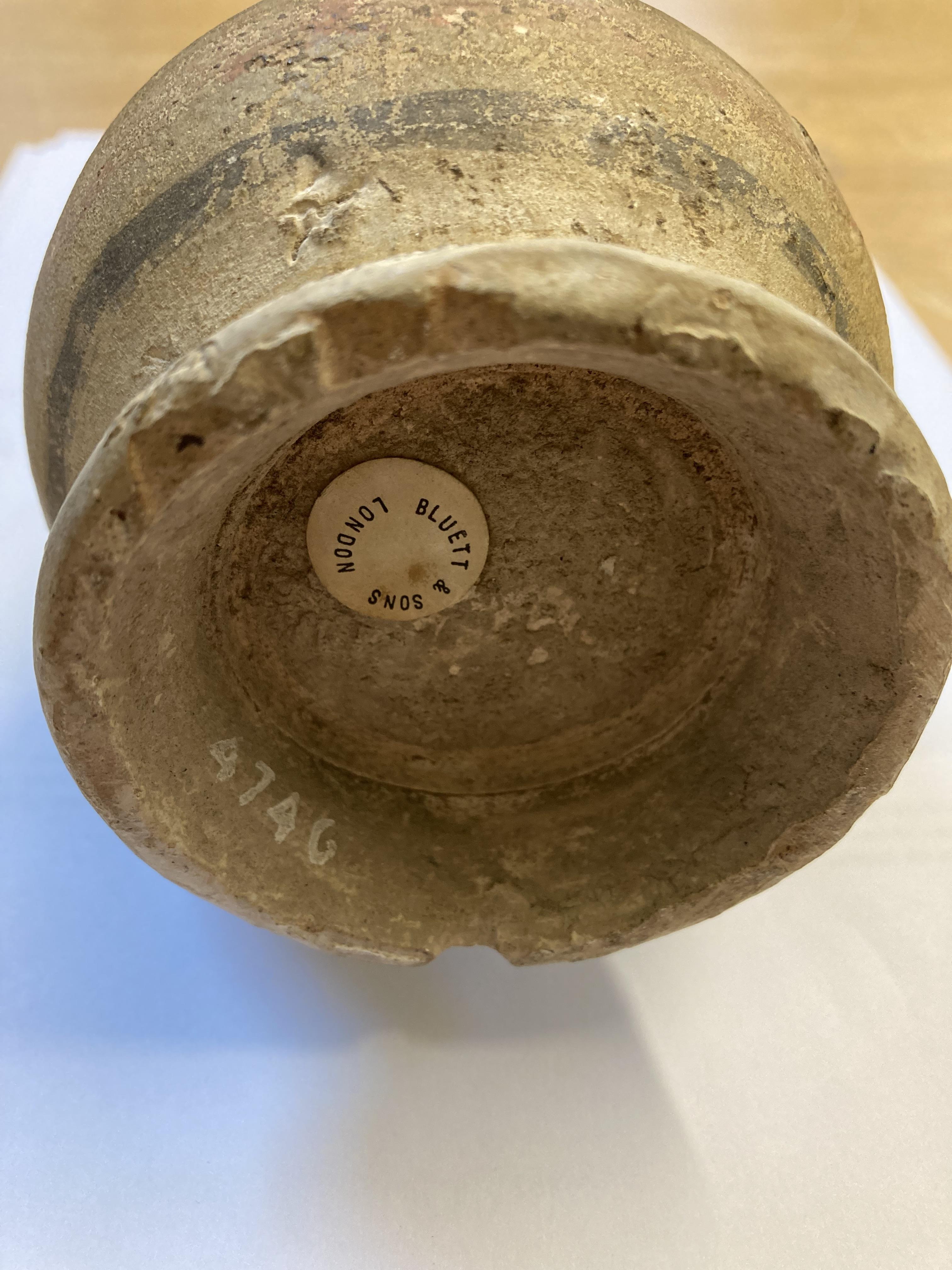 Lot 499 - Vase. A Chinese pottery vase, probably Han