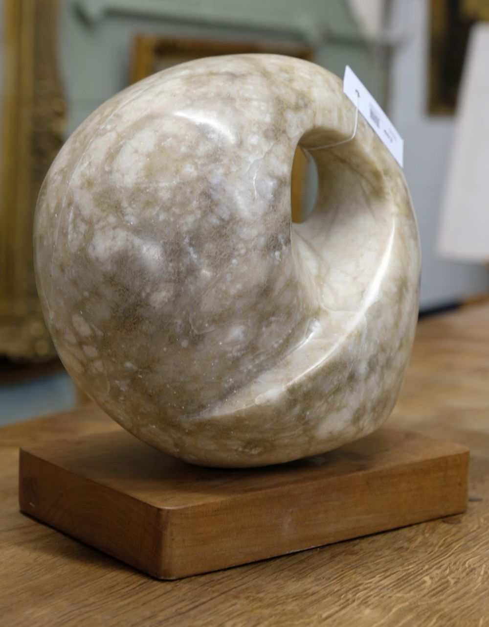 Lot 403 - Style of Barbara Hepworth. Pierced Ovoid