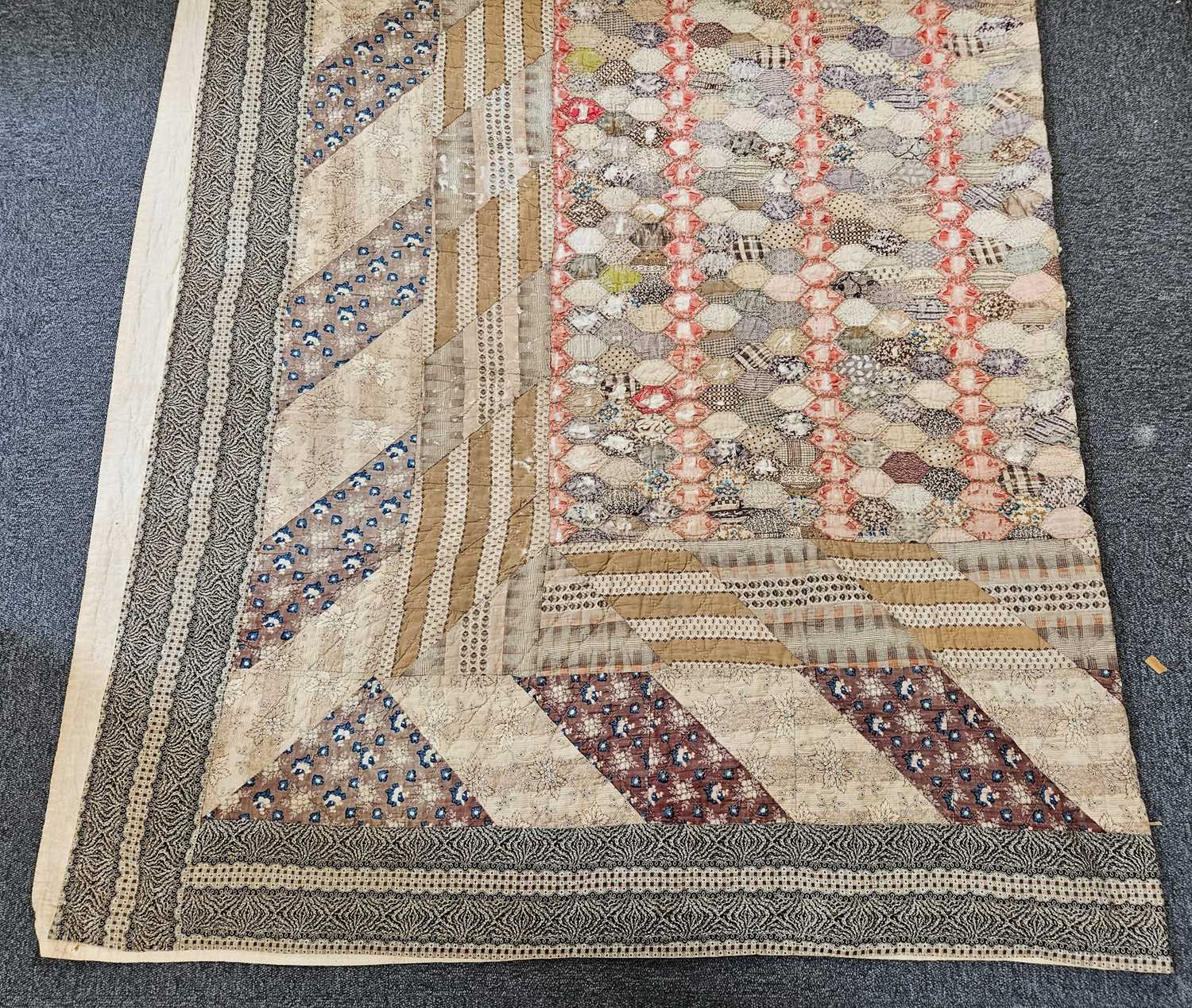 Lot 435 - Quilt. An early 19th century patchwork quilt