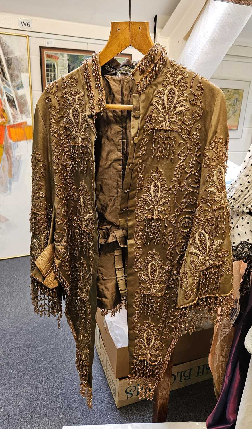 Lot 405 - Clothing. A collection of ladies' garments,