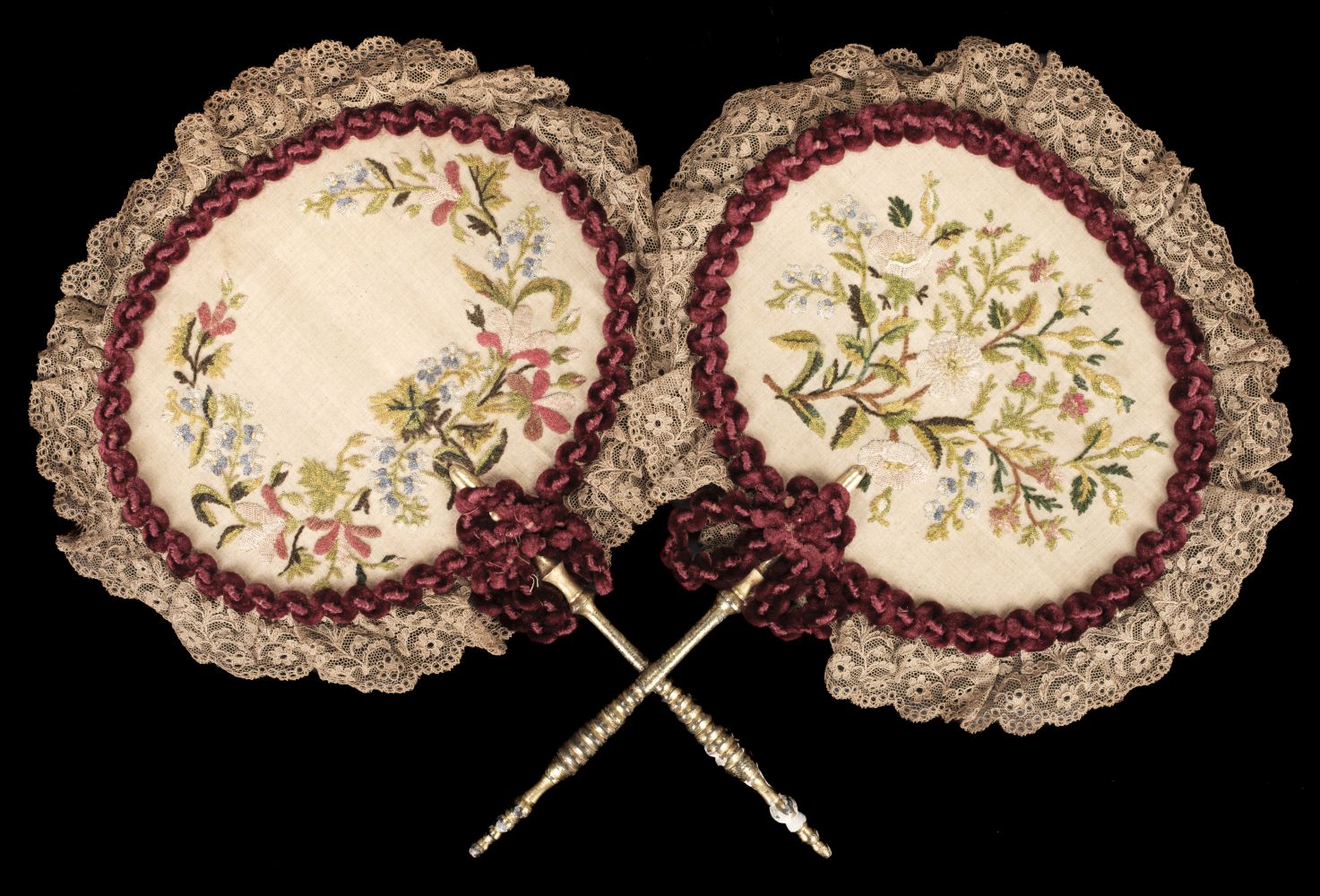 Lot 423 - Fans. A pair of embroidered face screen fans,