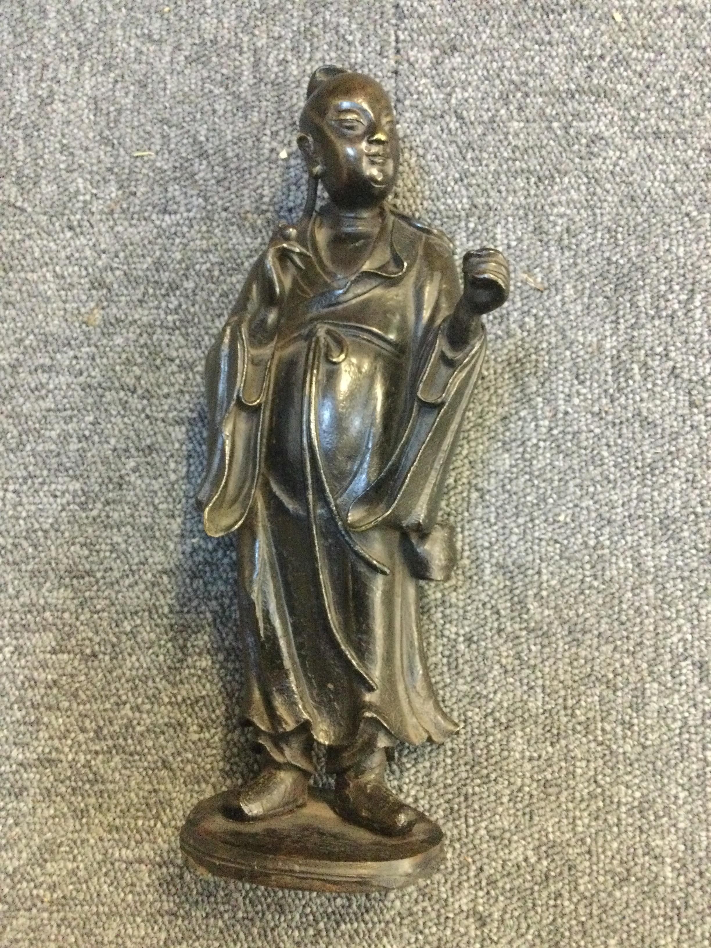 Lot 80 - Chinese bronze figure of Lu Dong Bin, Ming