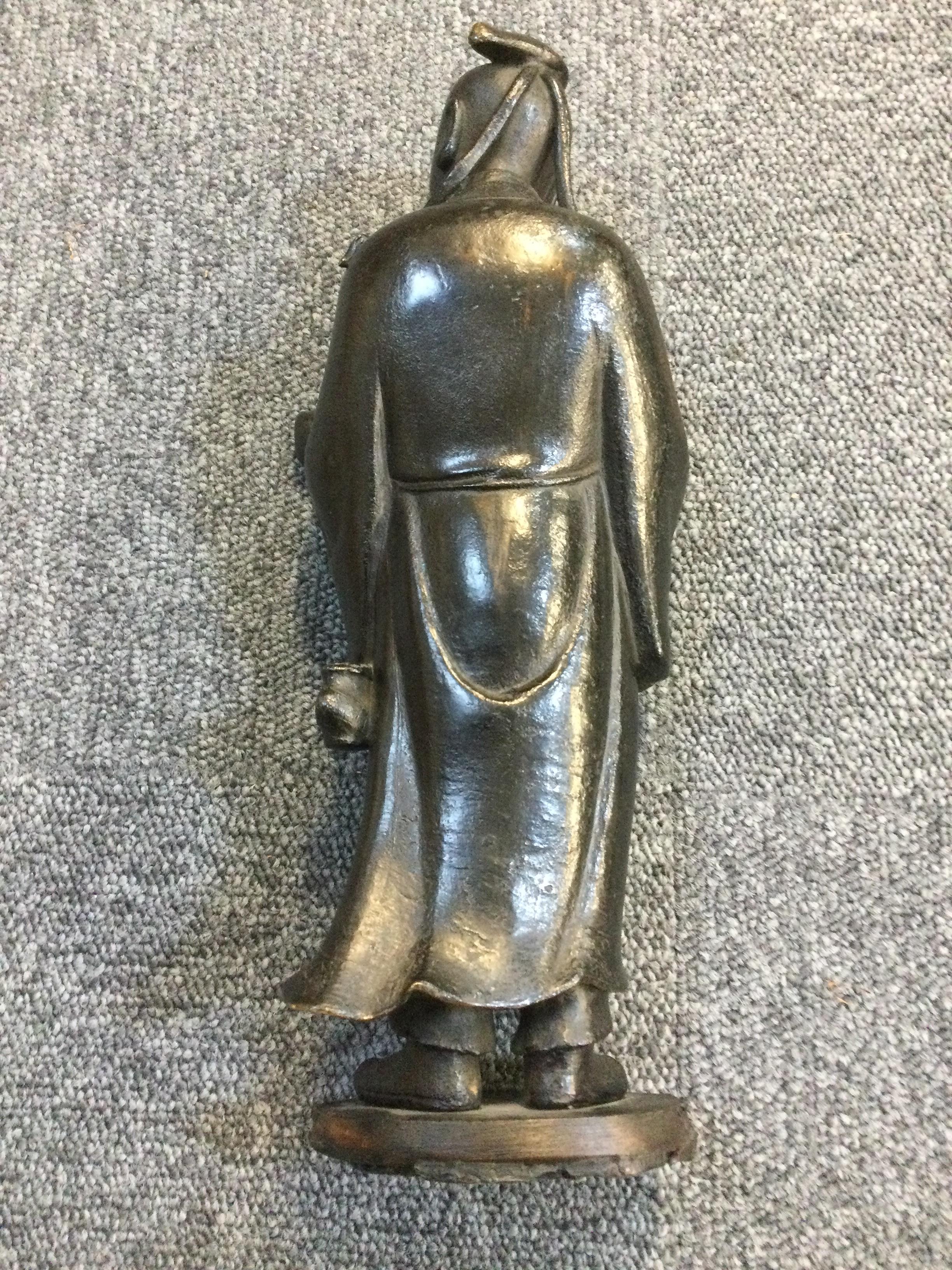 Lot 80 - Chinese bronze figure of Lu Dong Bin, Ming