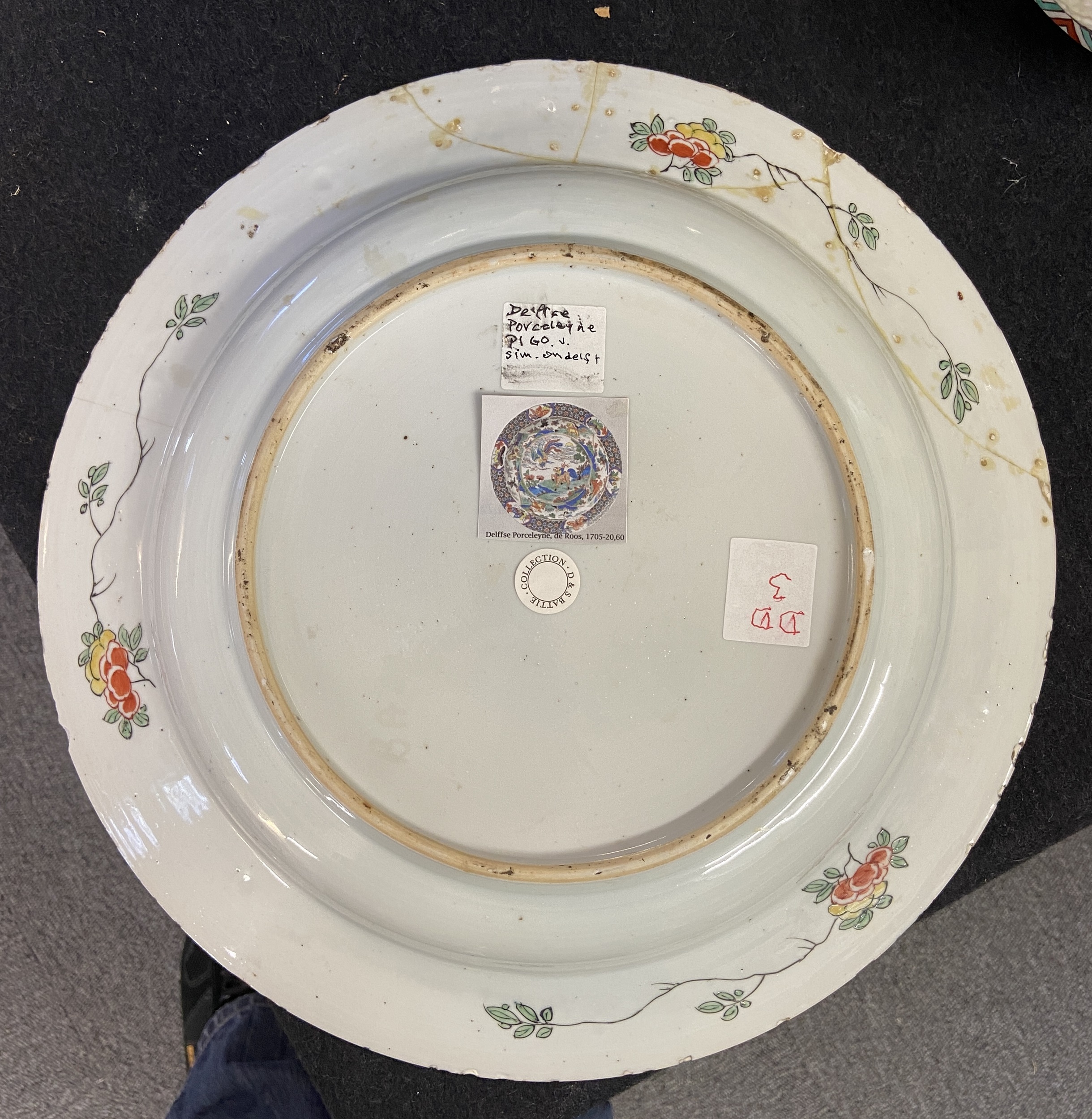 Lot 245 - Fine Delft polychrome charger, 1705-1720,