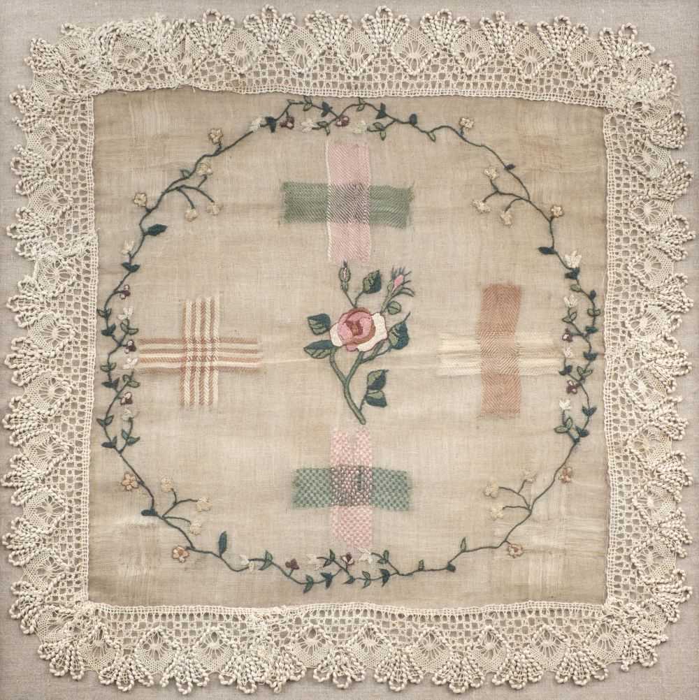 Lot 438 - Sampler. A lace-trimmed darning sampler,