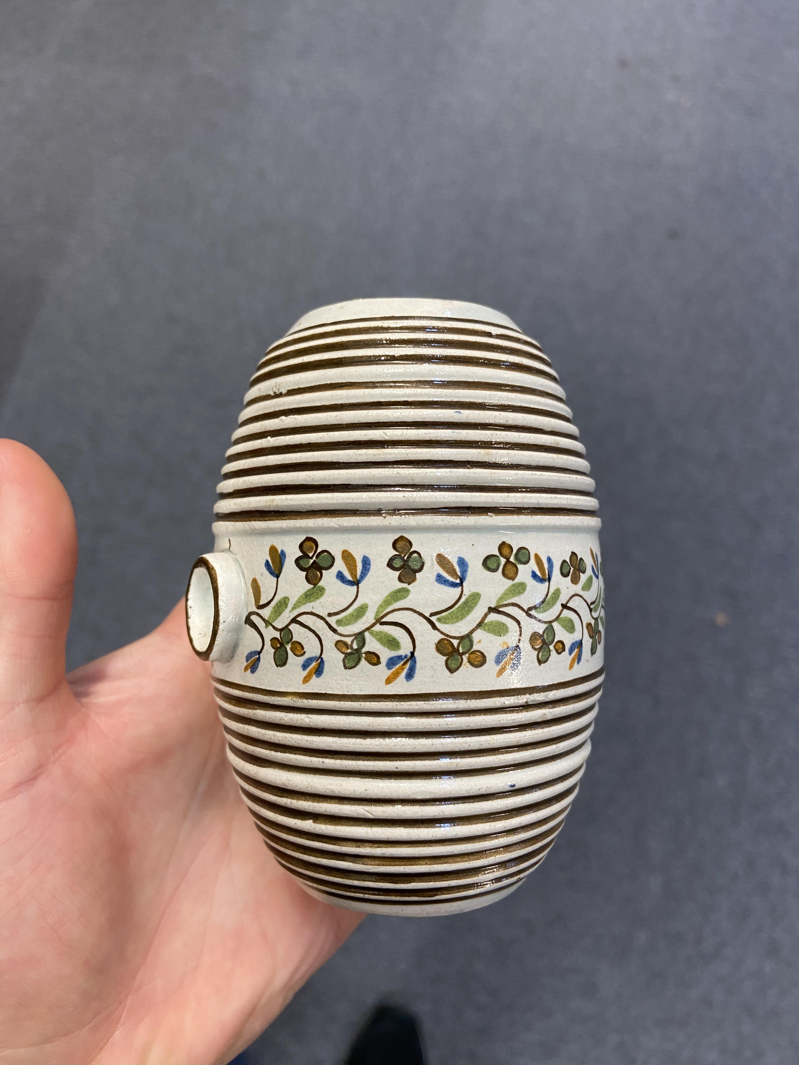 Lot 250 - A Bristol Pottery Prattware type spirit