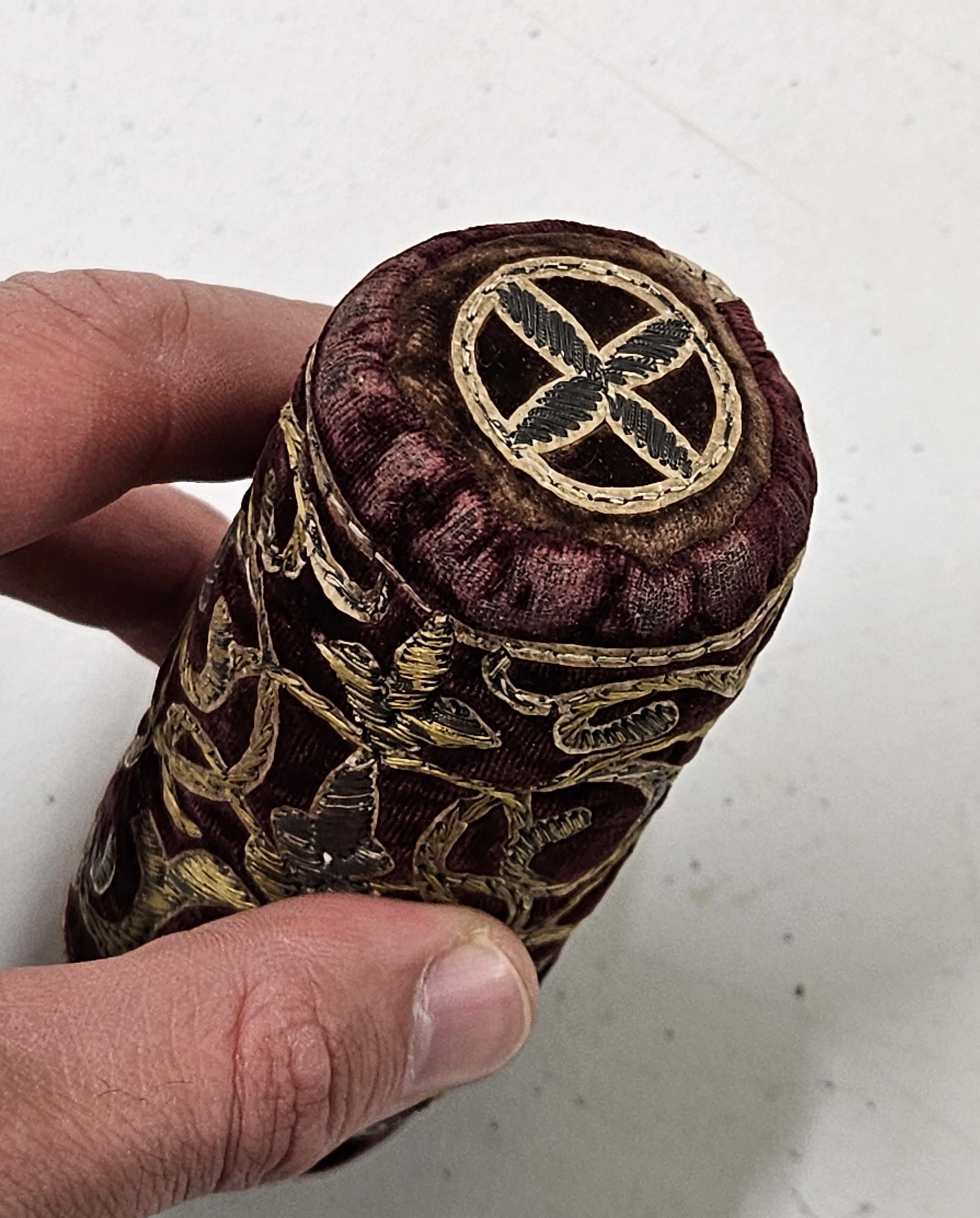 Lot 415 - Embroidered scroll case. A metalwork scroll