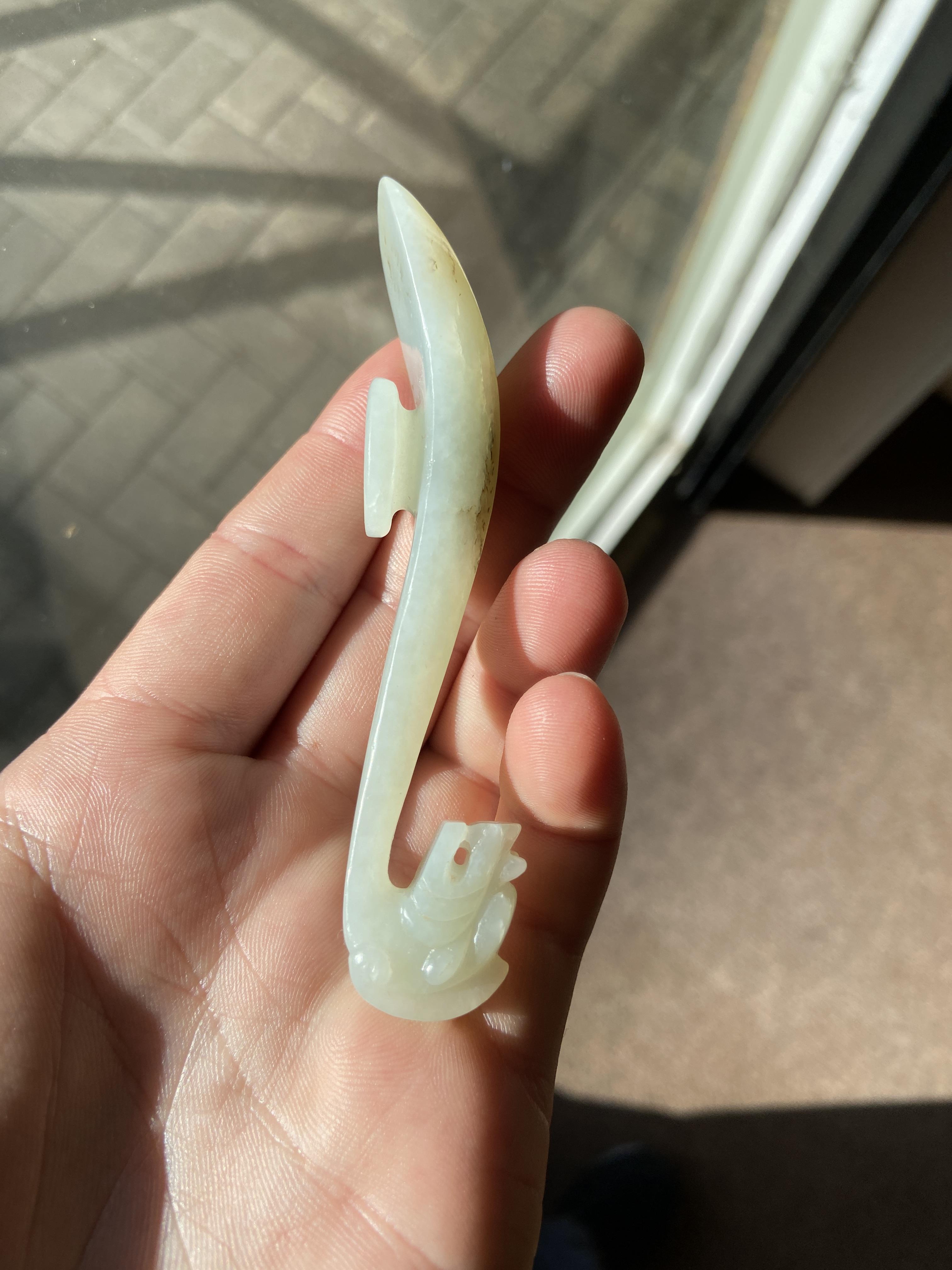 Lot 315 - Jade. Chinese jade belt hooks