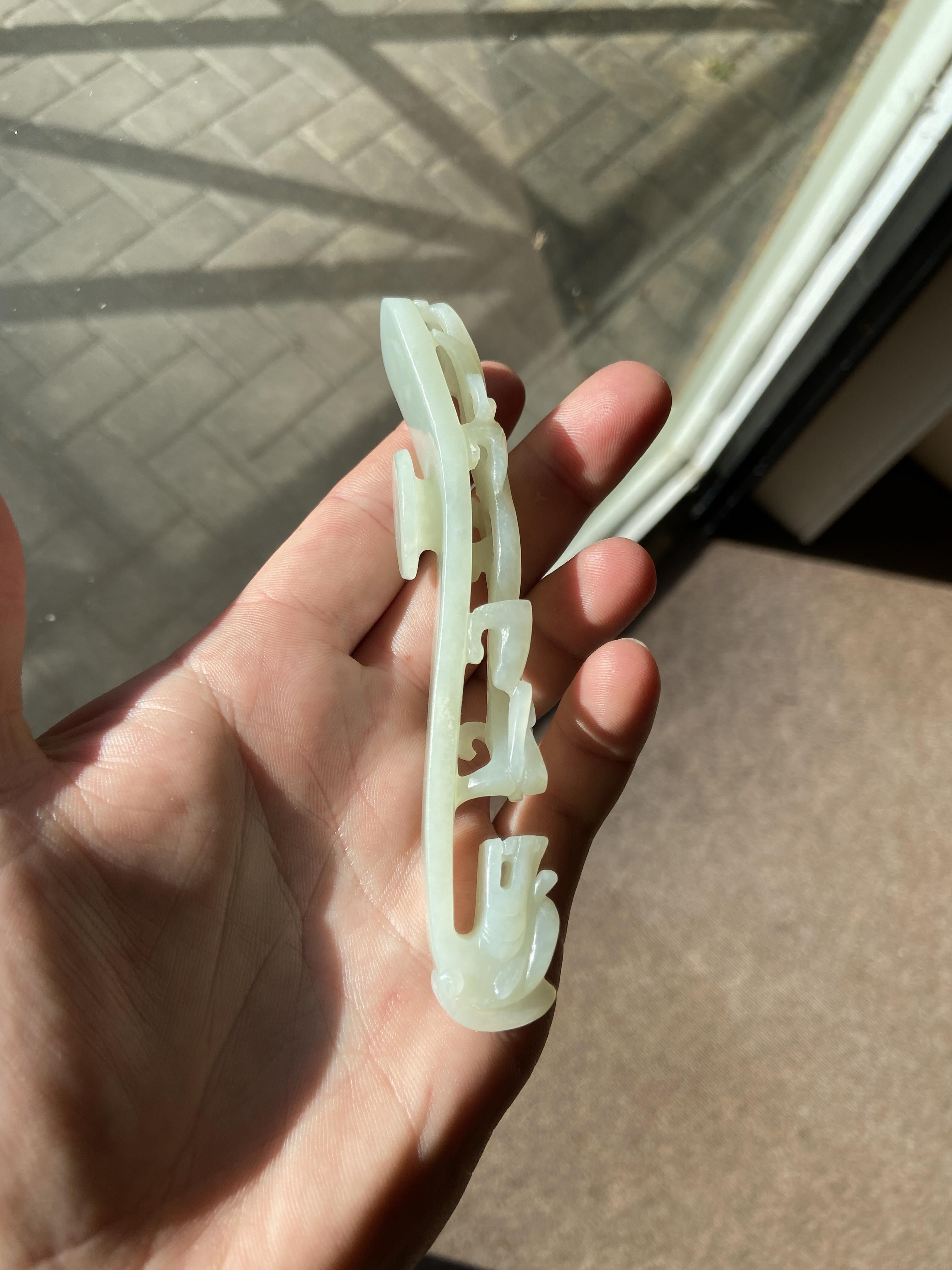 Lot 315 - Jade. Chinese jade belt hooks