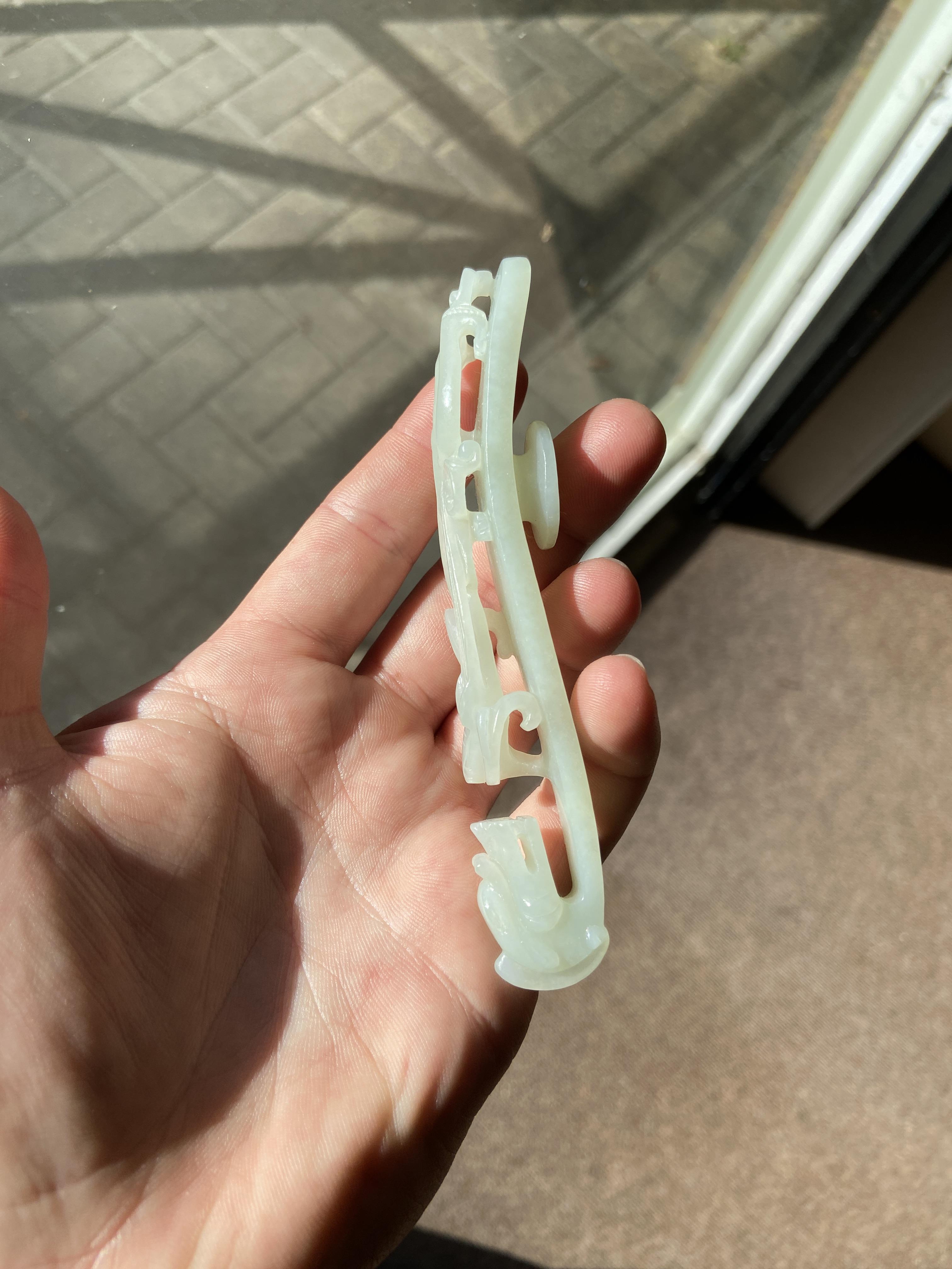 Lot 315 - Jade. Chinese jade belt hooks