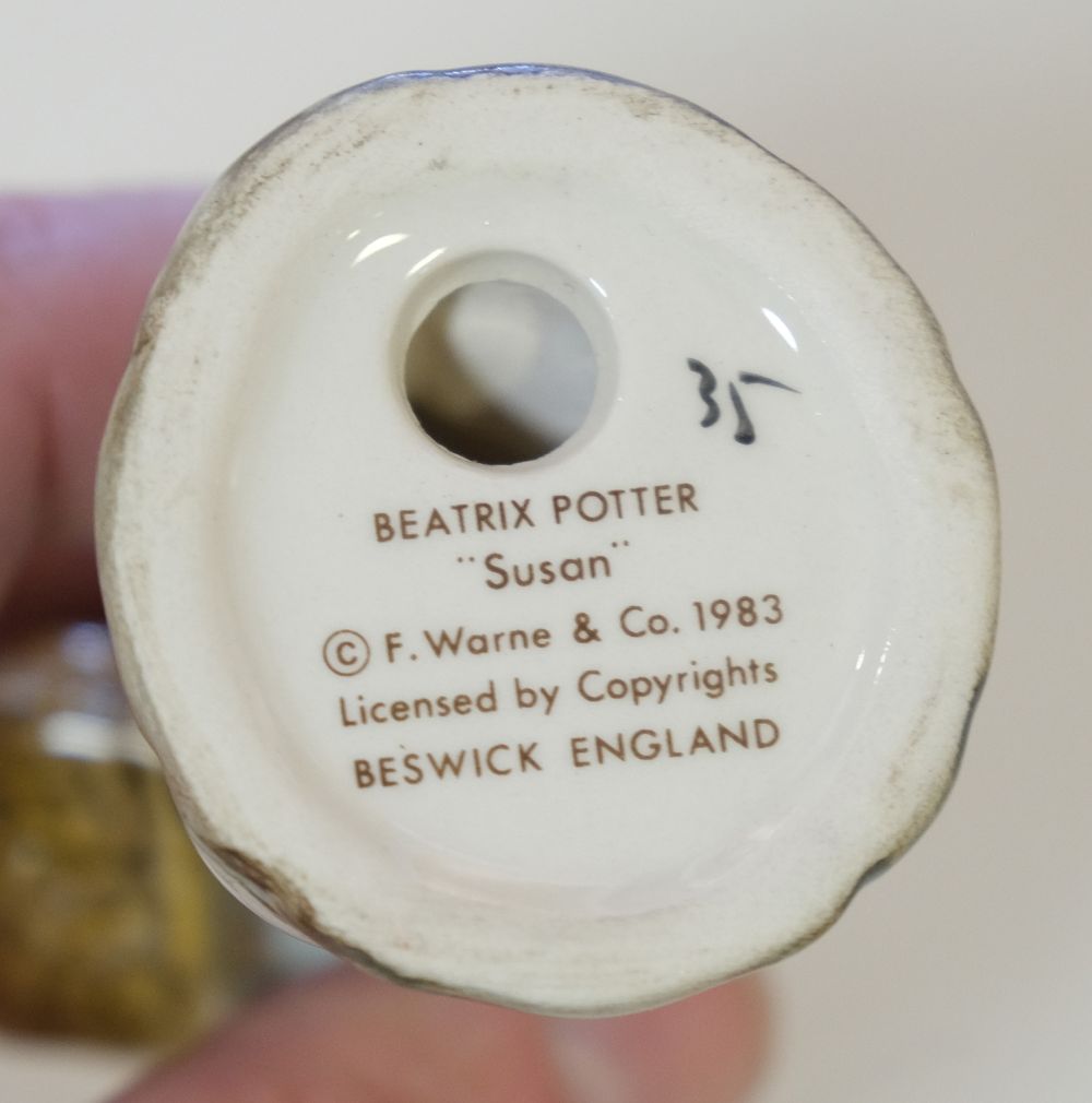 Lot 614 - Beswick. A group of Beatrix Potter pottery