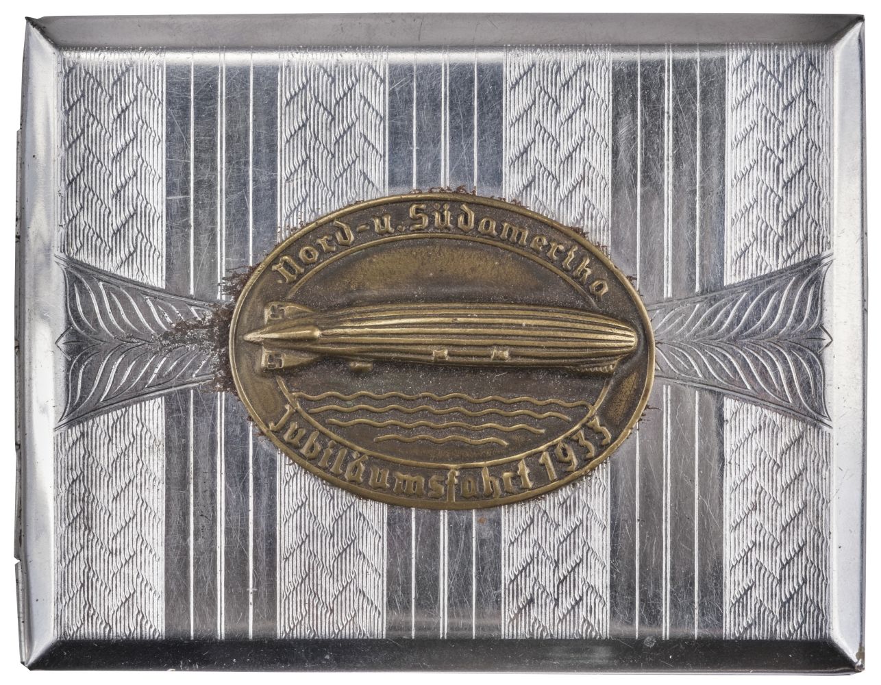Lot 75 - Zeppelin. An art deco Zeppelin silver-plated