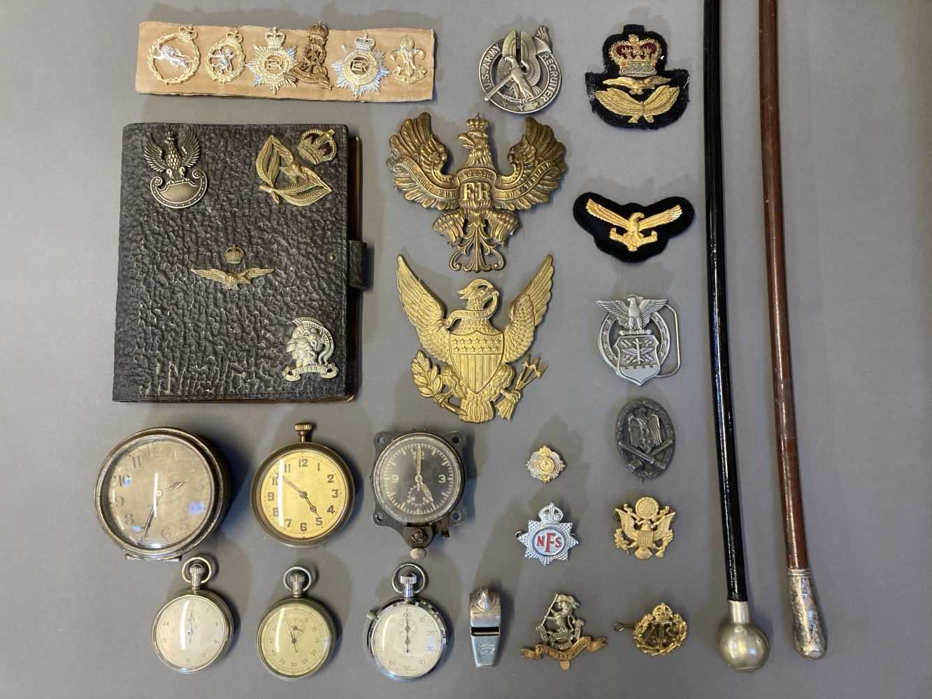Lot 128 - Military Badges. A mixed collection of