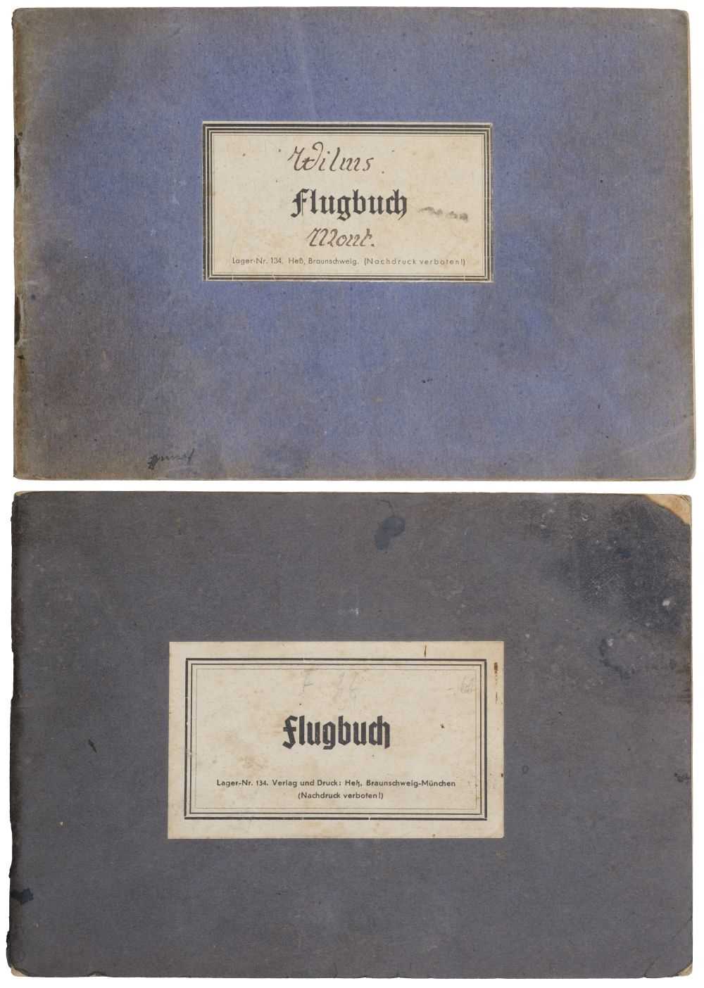 Lot 457 - Log Books. Two Luftwaffe log books kept by