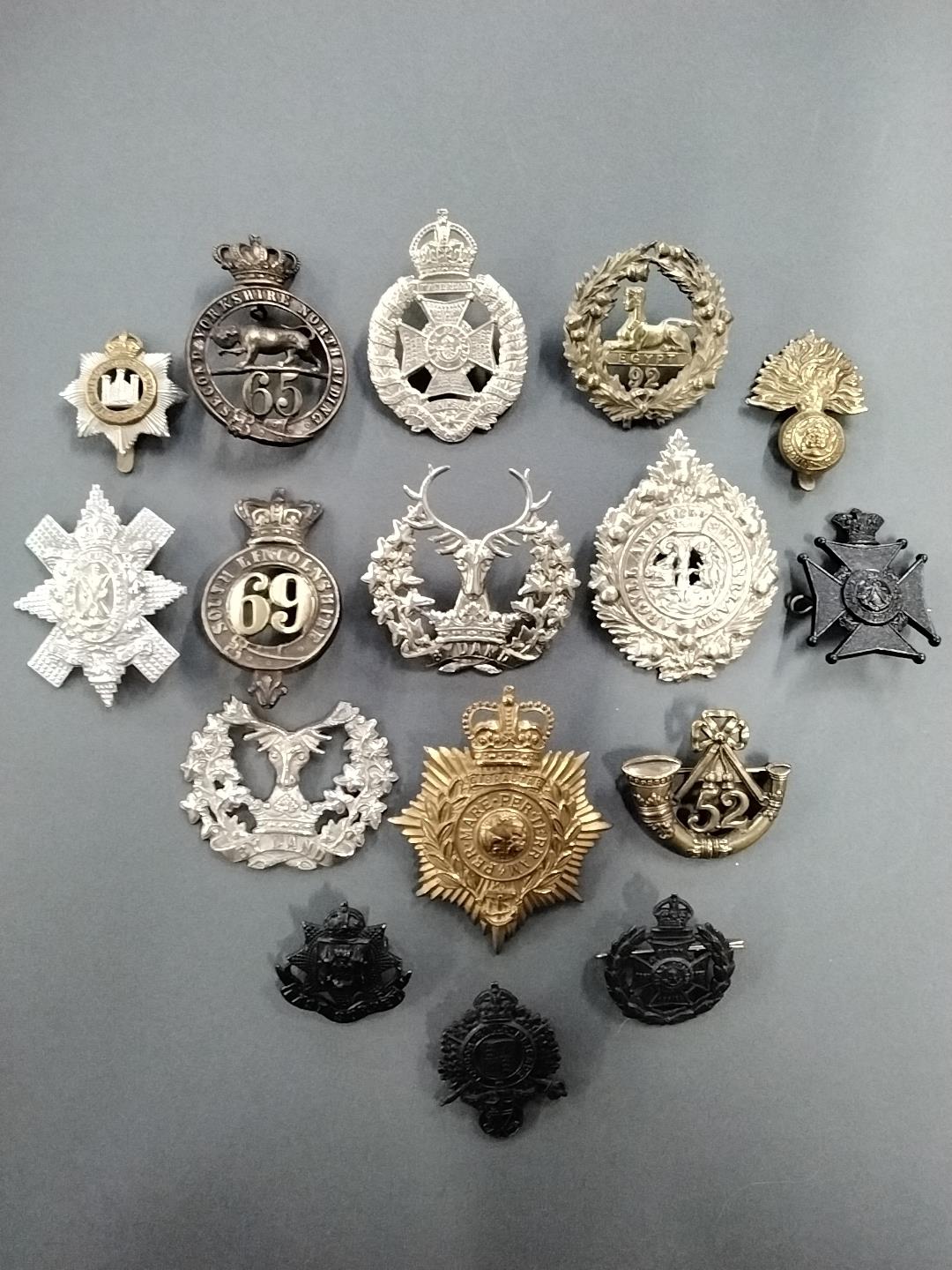 Lot 247 - Cap Badges. A collection of Victorian and