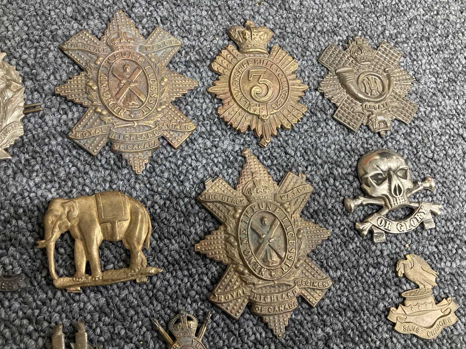 Lot 61 - Cap Badges. Victorian and WWI regimental cap