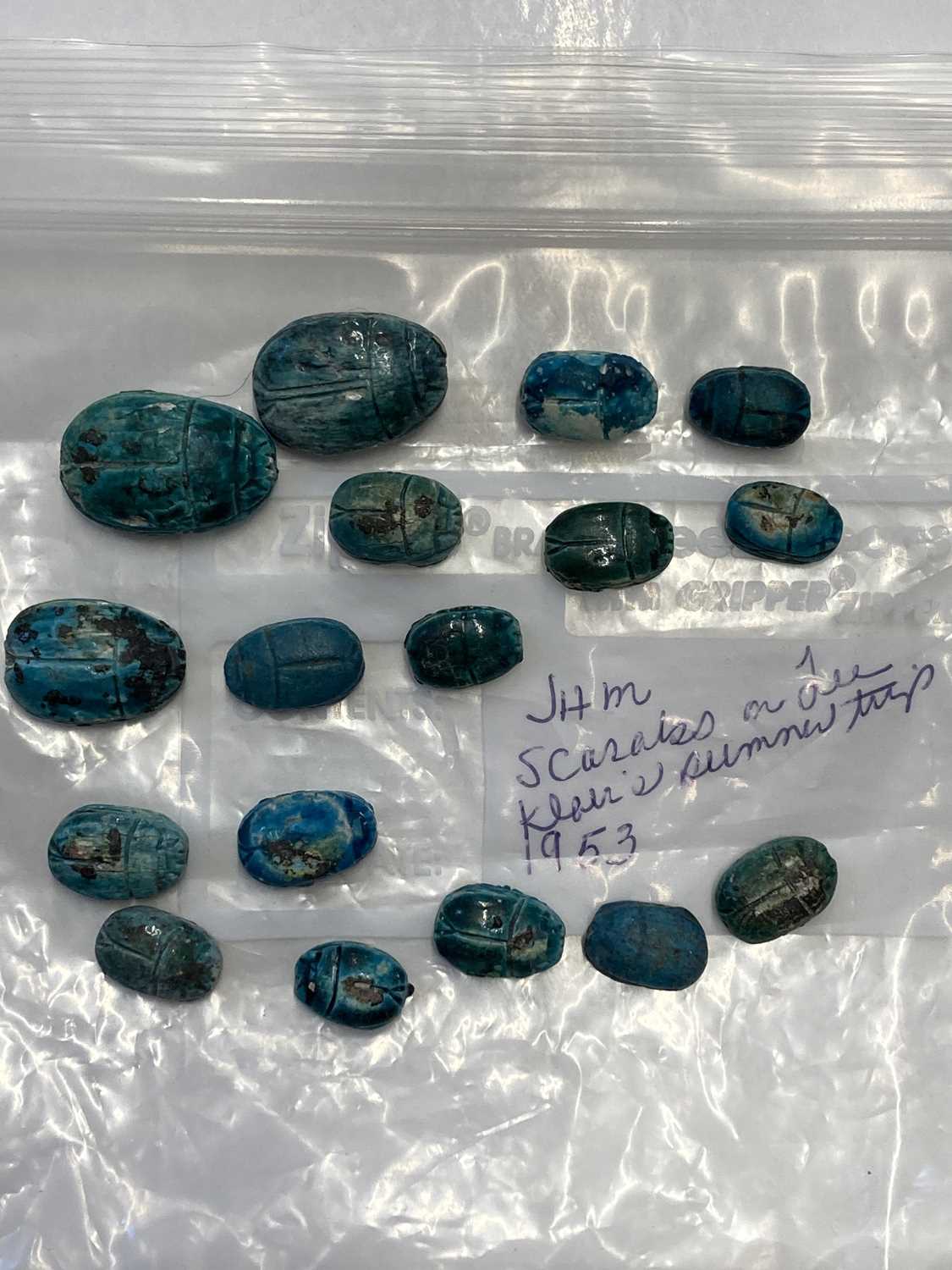 Lot 647 - Scarabs. A collection of 17 Egyptian faience