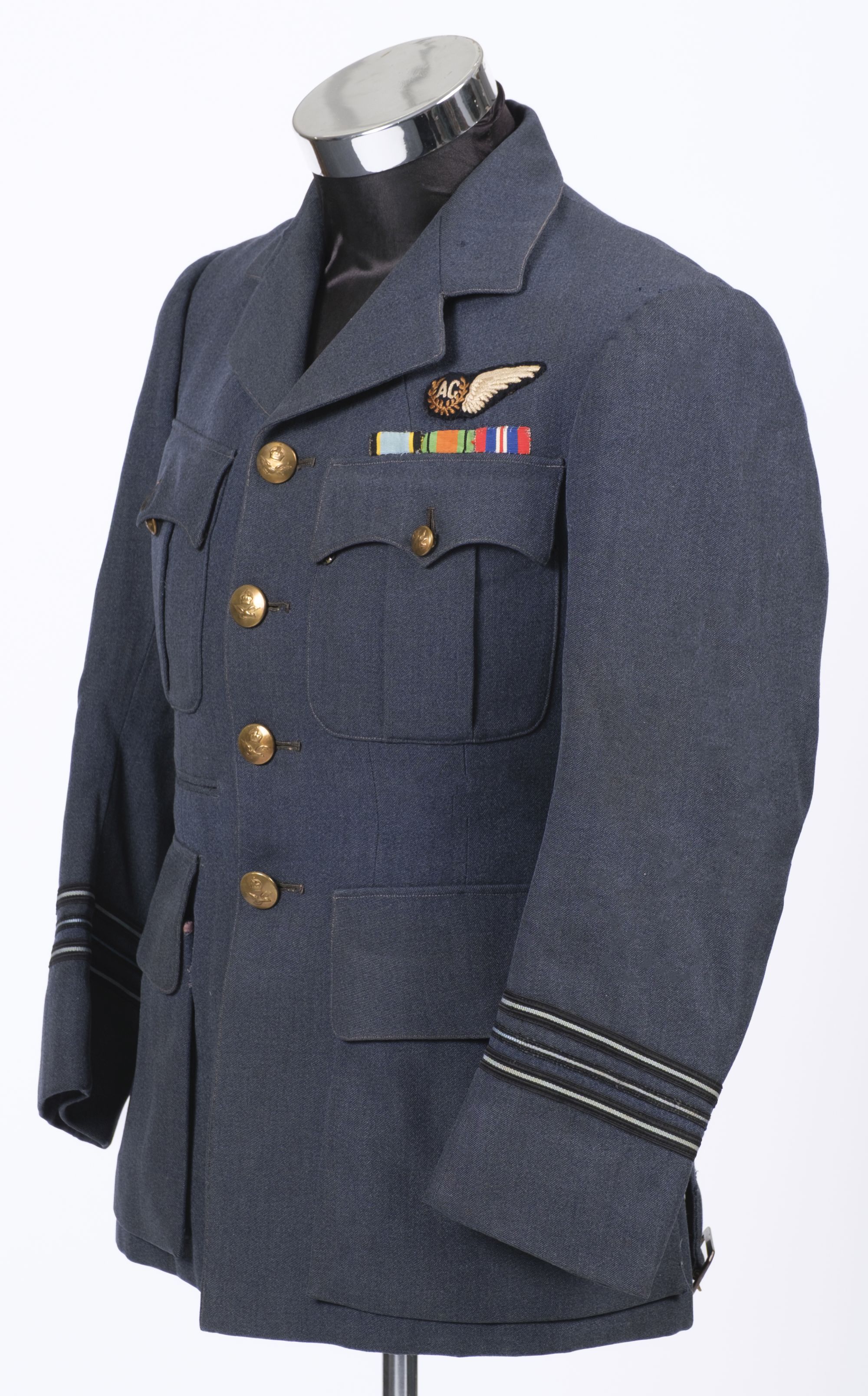 Lot 455 - RAF Uniforms. WWII uniforms including tunics,