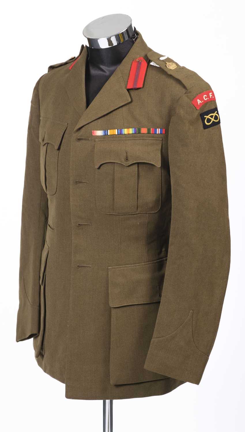 Lot 265 - Military Uniforms. A WWII officers' uniform