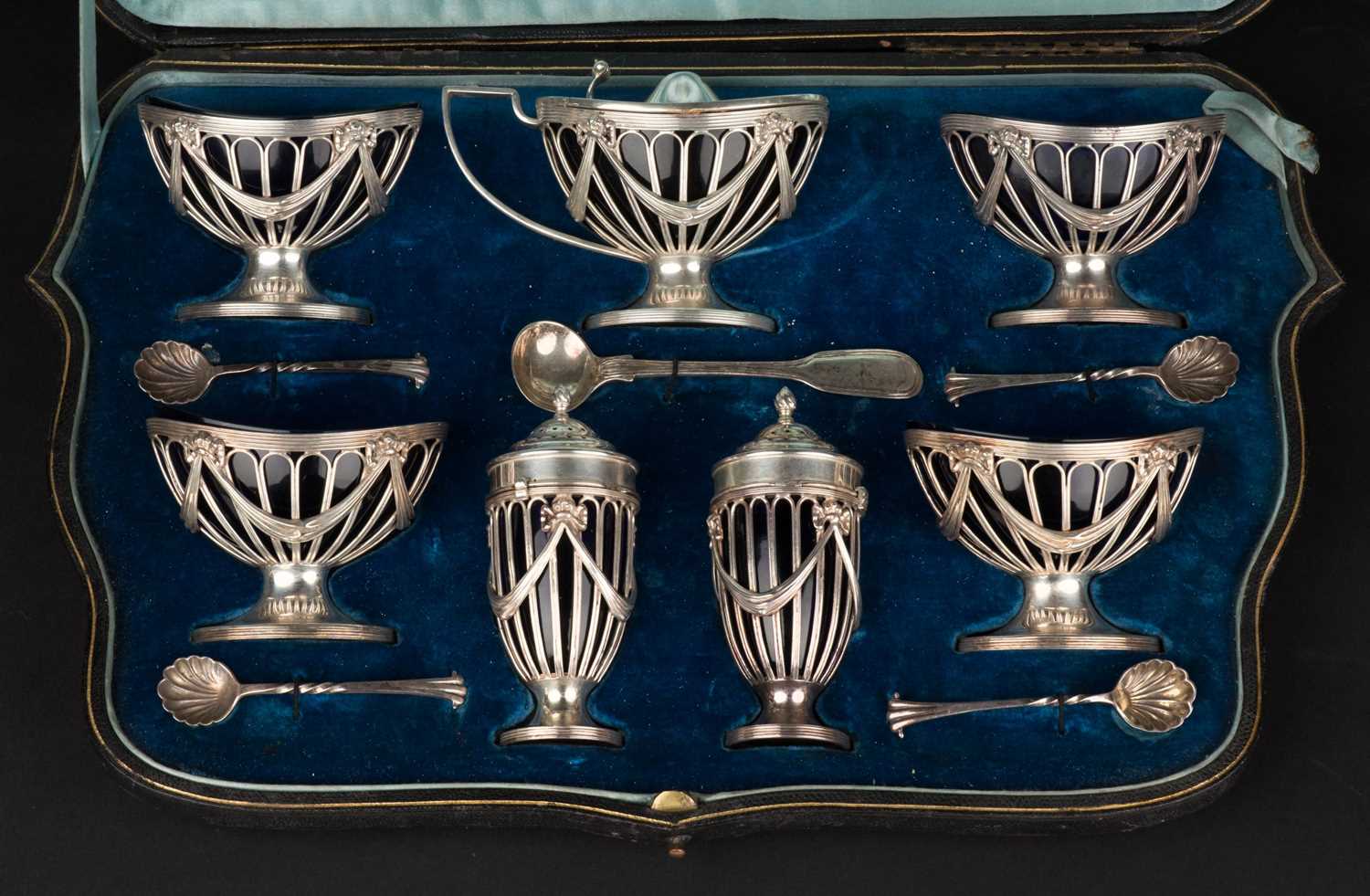 Lot 695 - Condiment set. An Edwardian Silver Condiment